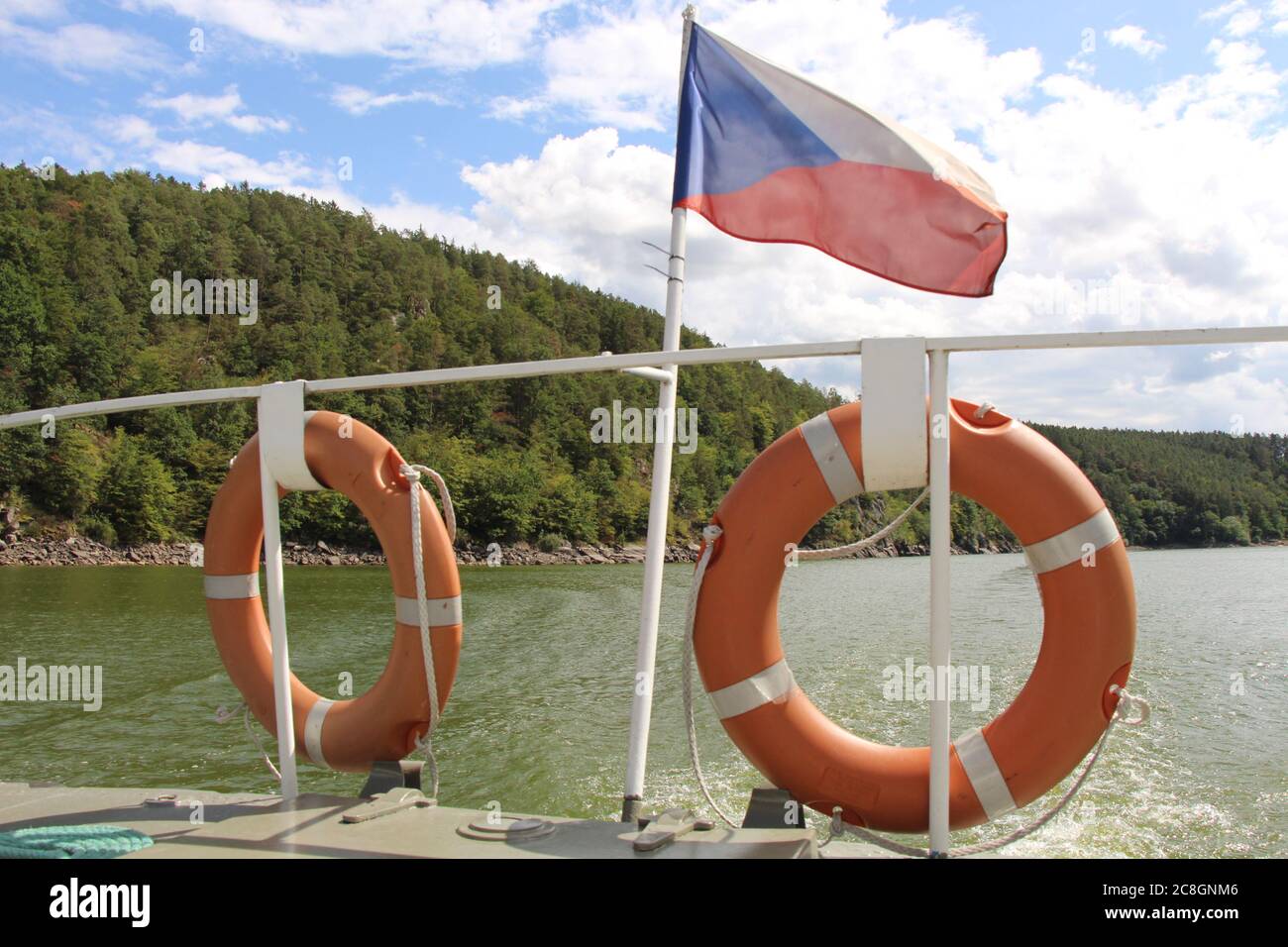 The Czech flag is on display on a boat in Zvikov down the river. Two ...