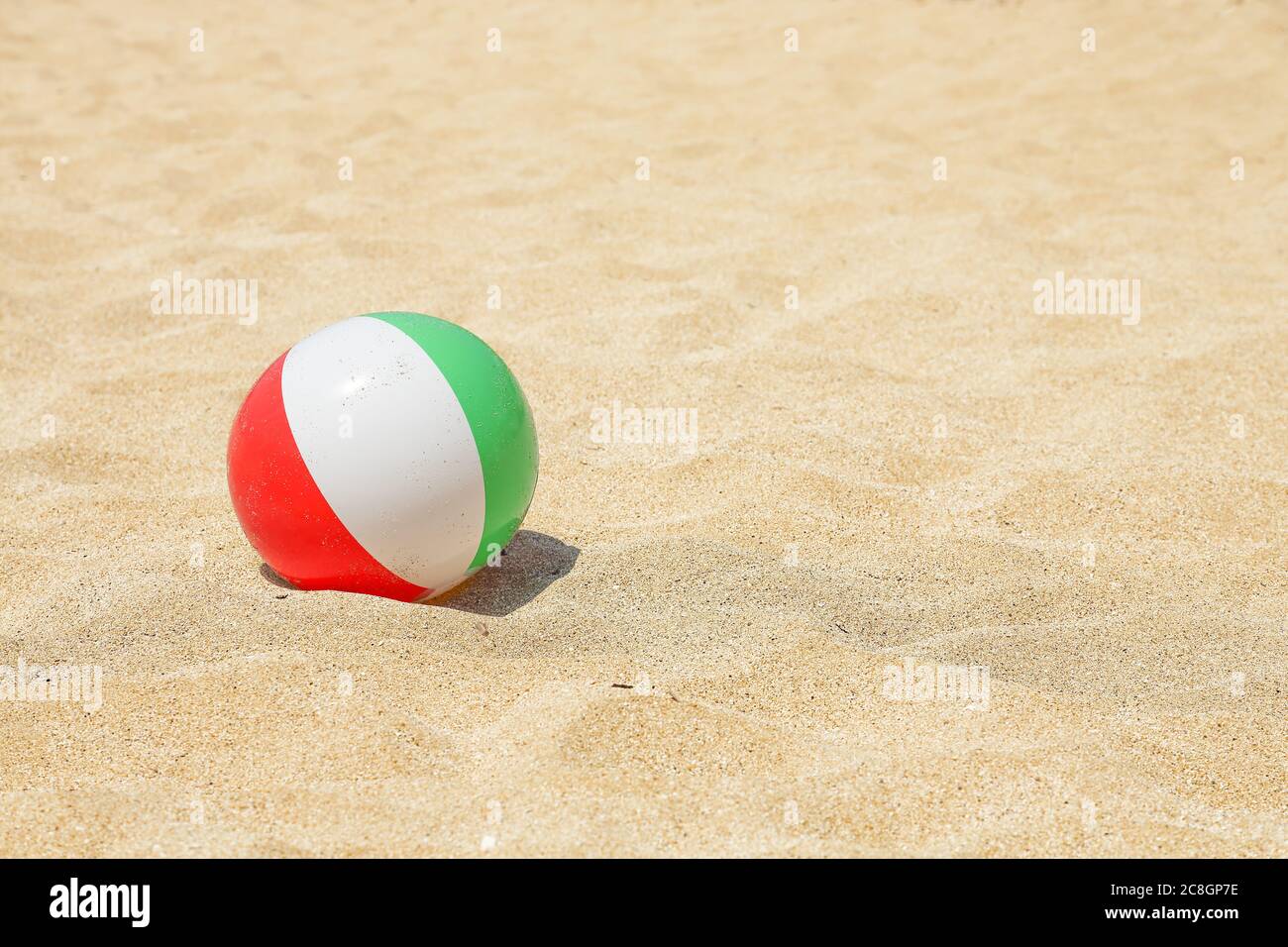 colorful plastic ball on the beach Stock Photo - Alamy