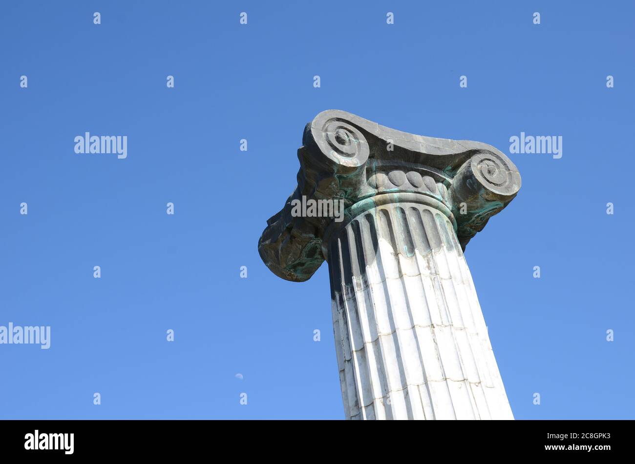Ancient column on a background of pure blue sky Stock Photo - Alamy