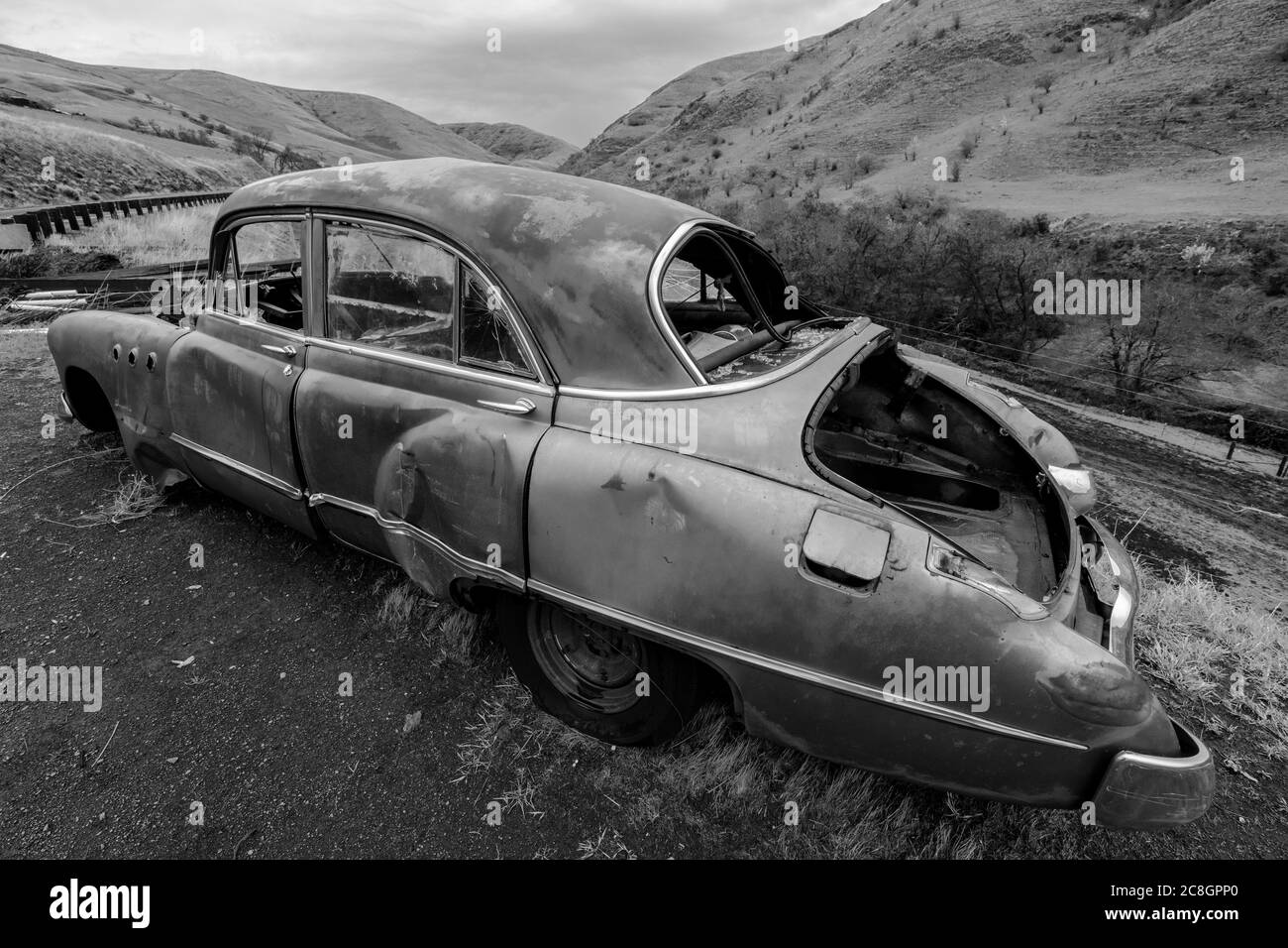 Rusty car wreck Black and White Stock Photos & Images - Alamy
