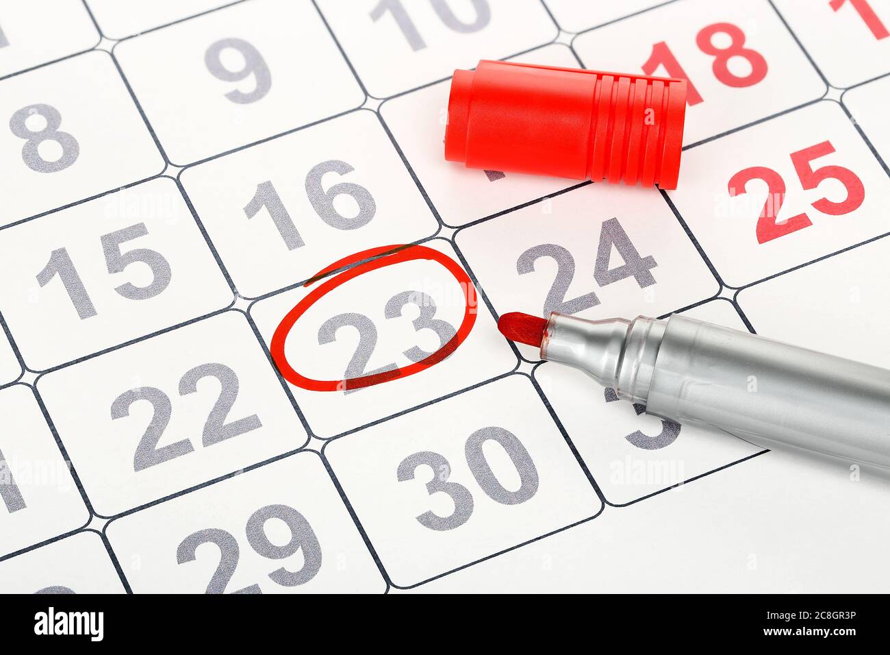 specific date has been circled with red marker on calendar Stock Photo ...