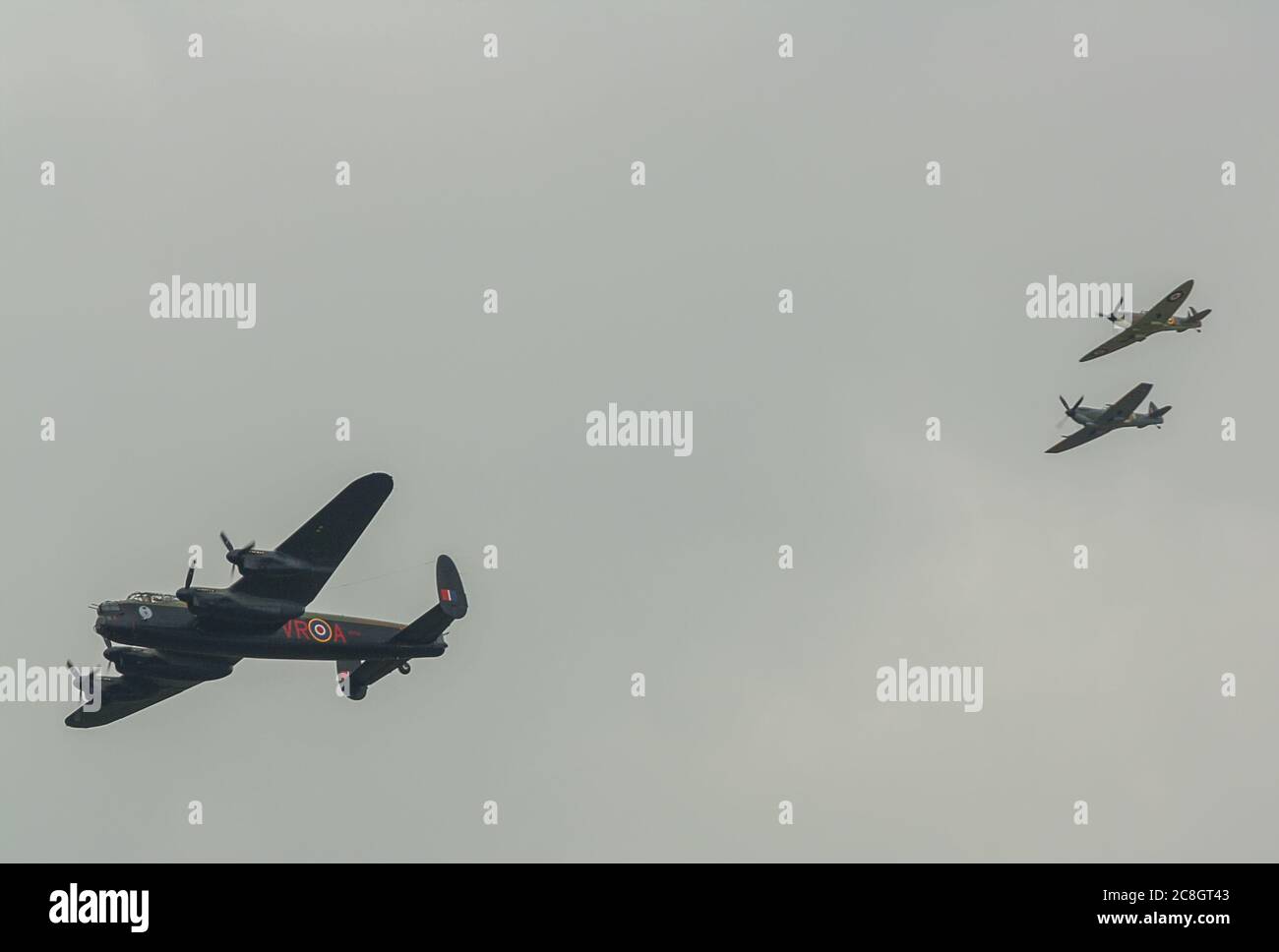 The RAF's iconic Avro Lancaster heavy bomber escorted by Supermaine ...