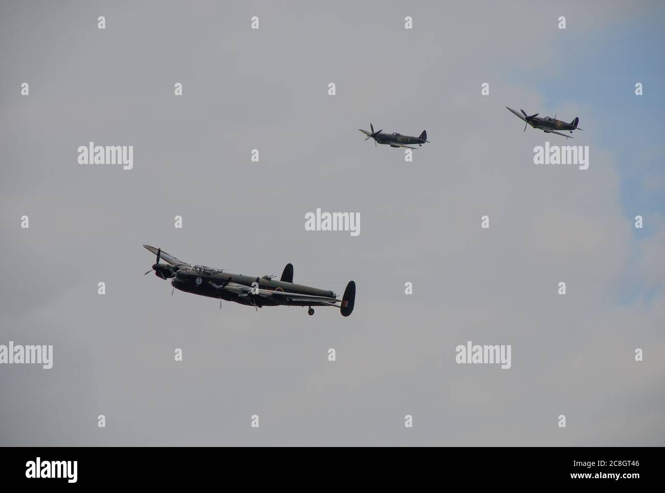 The RAF's iconic Avro Lancaster heavy bomber escorted by Supermaine ...