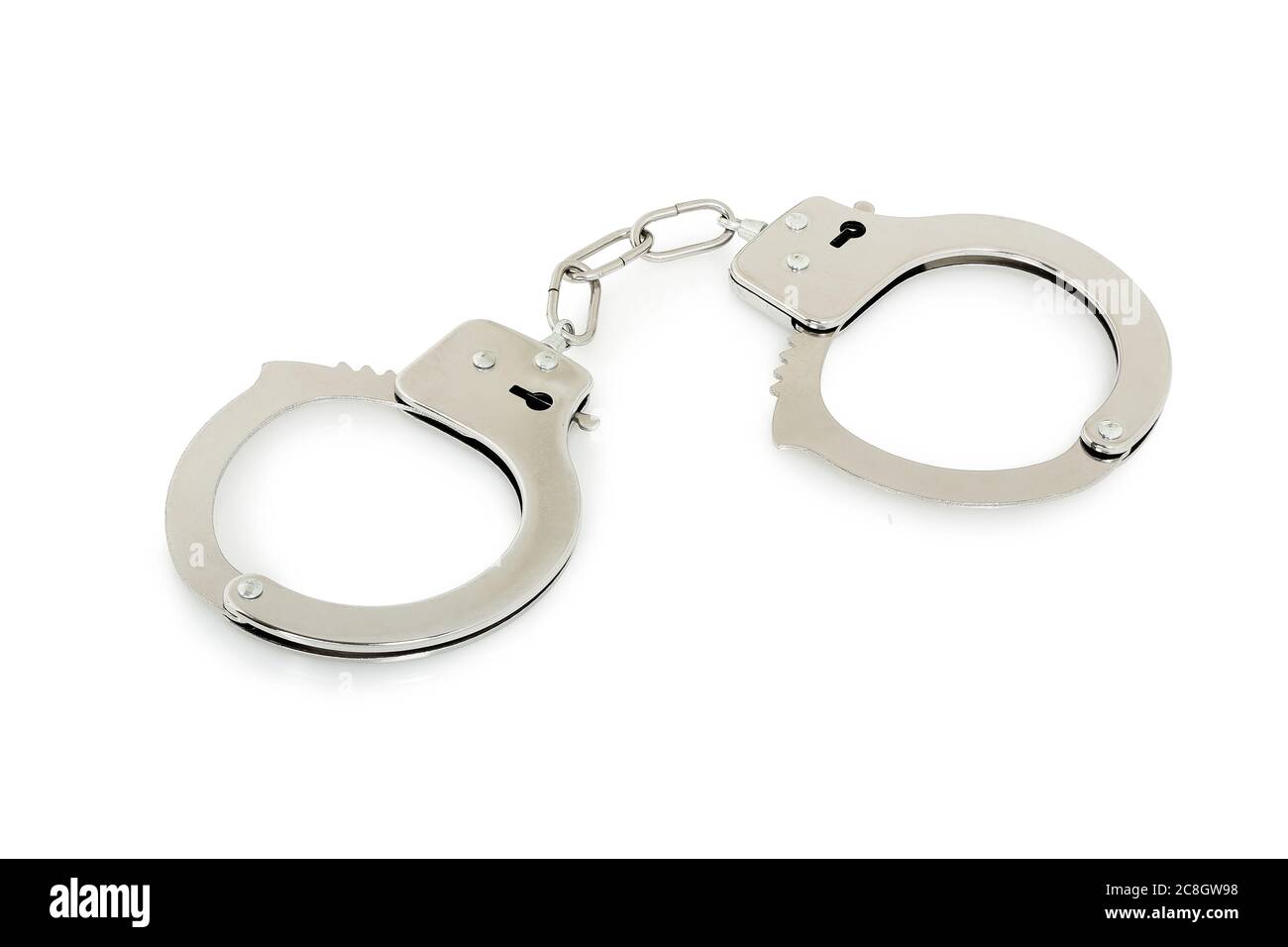 handcuffs isolated on white background Stock Photo - Alamy