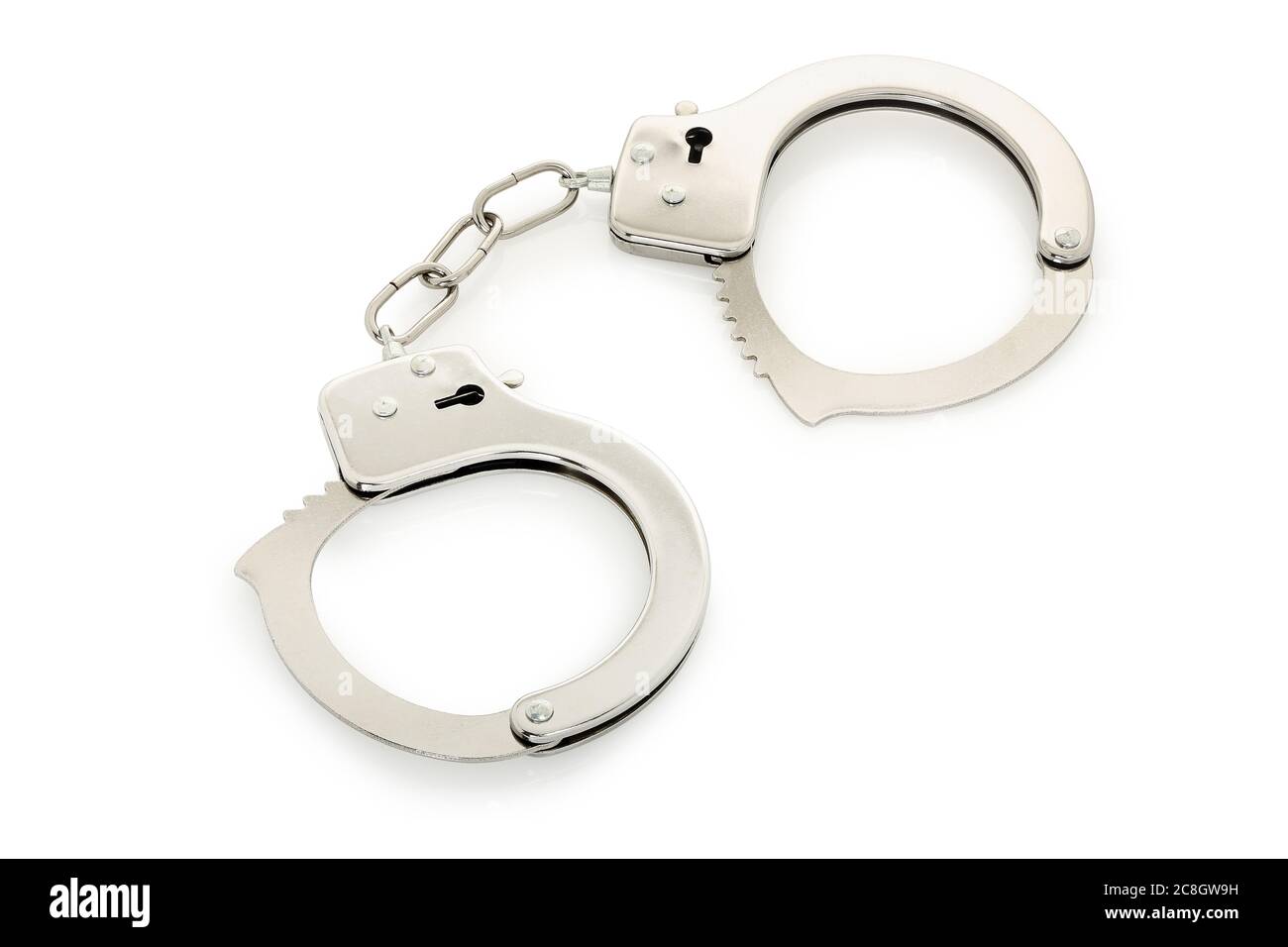 handcuffs isolated on white background Stock Photo - Alamy