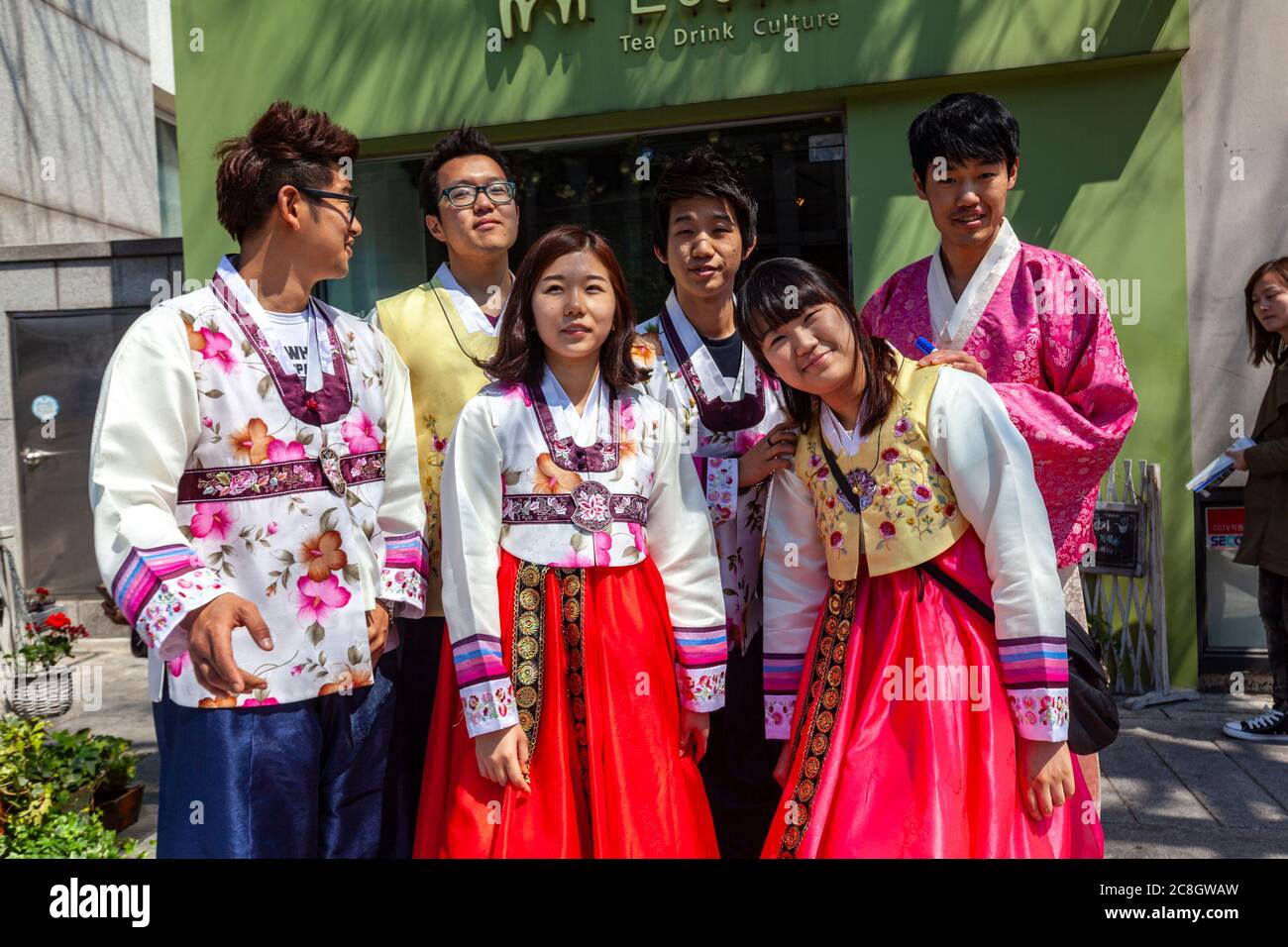 Group of young people wearing Hanbok traditional Korean dress near ...