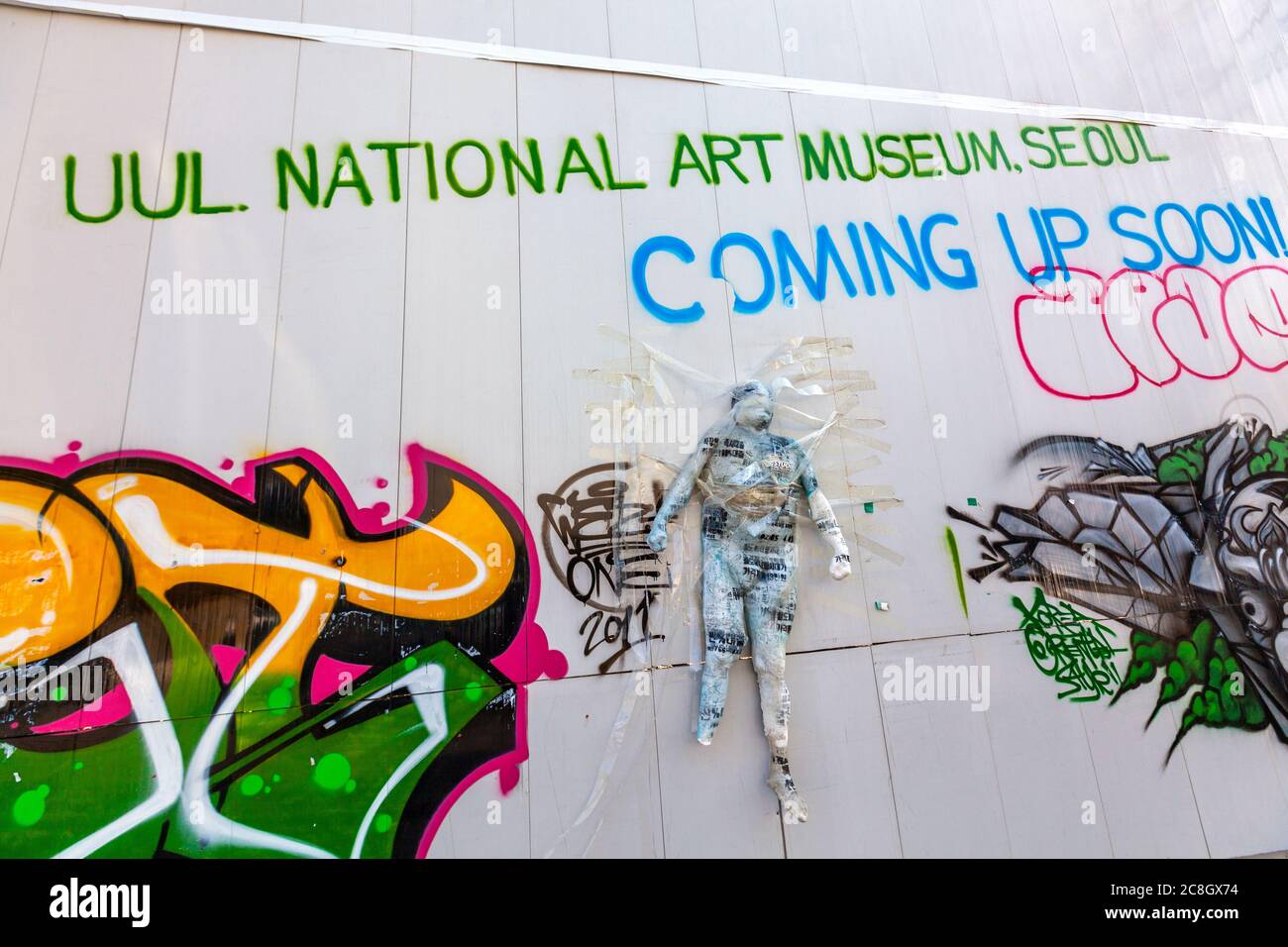 Fence with graffiti and art street in location before MMCA, Samcheong ...