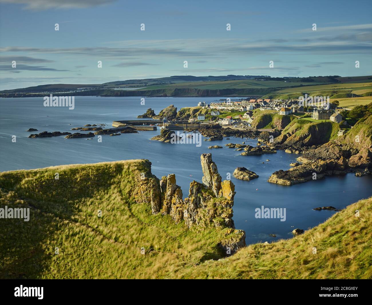 A Long Exposure photograph of the rocky shoreline at Cove, Scottish ...