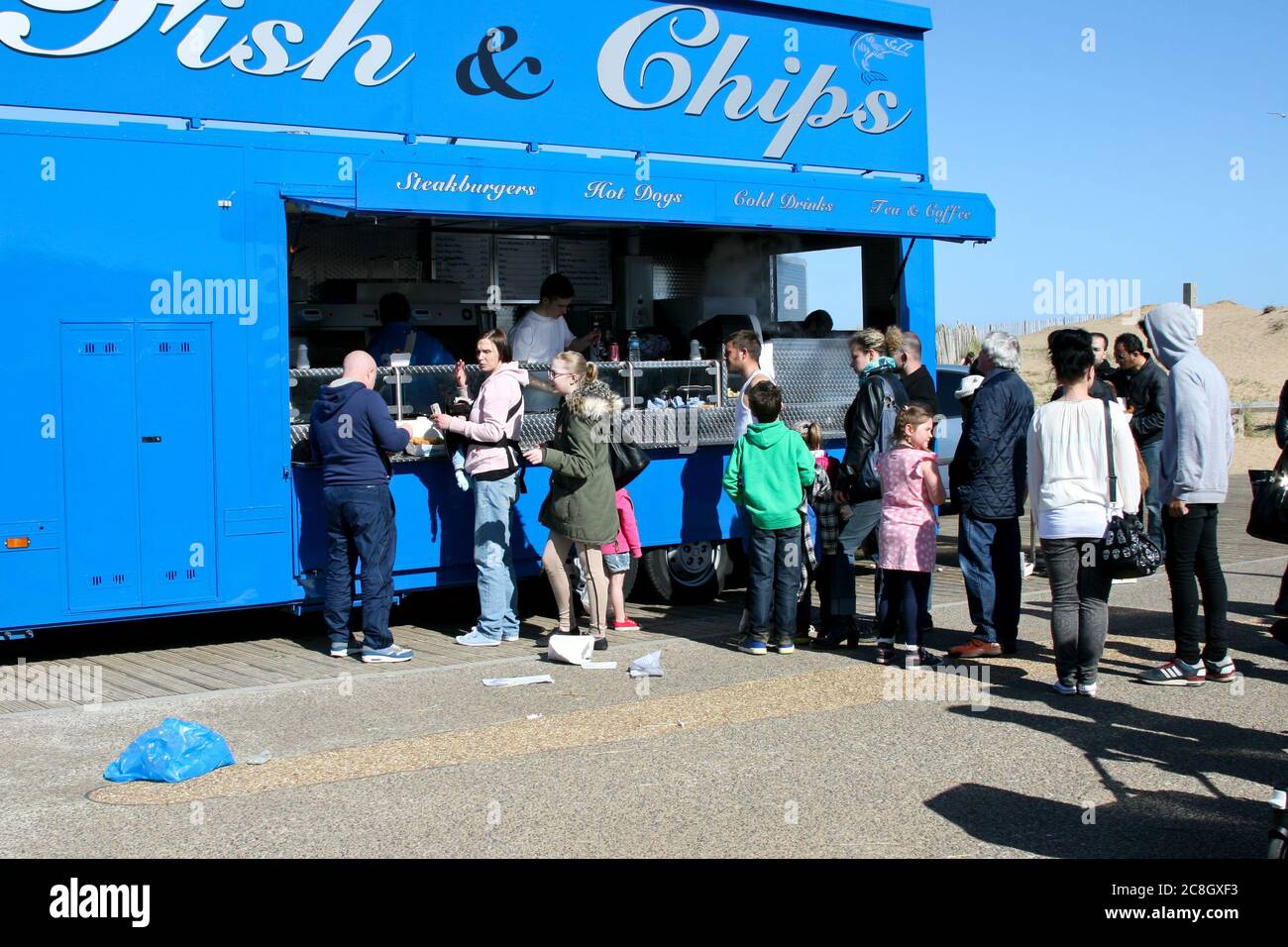 Woman fish and chips seaside hi-res stock photography and images - Alamy
