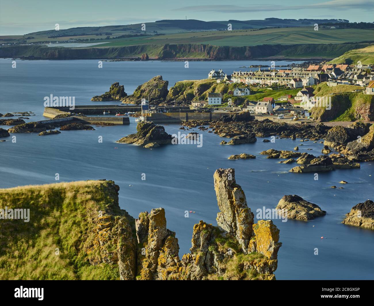 A Long Exposure photograph of the rocky shoreline at Cove, Scottish ...
