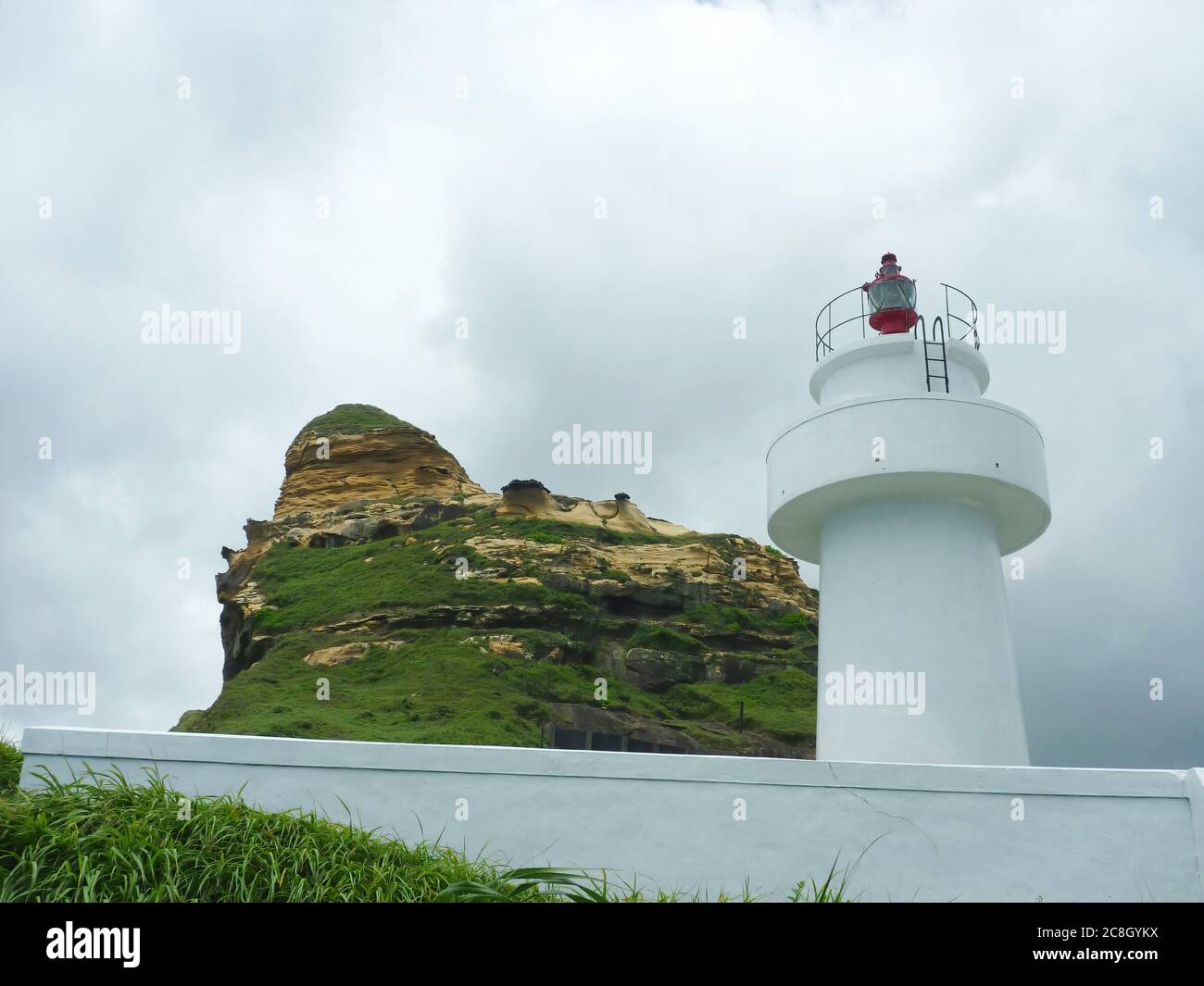 Cloudy view of the Bitoujiao Lighthouse at New Taipei City, Taiwan ...