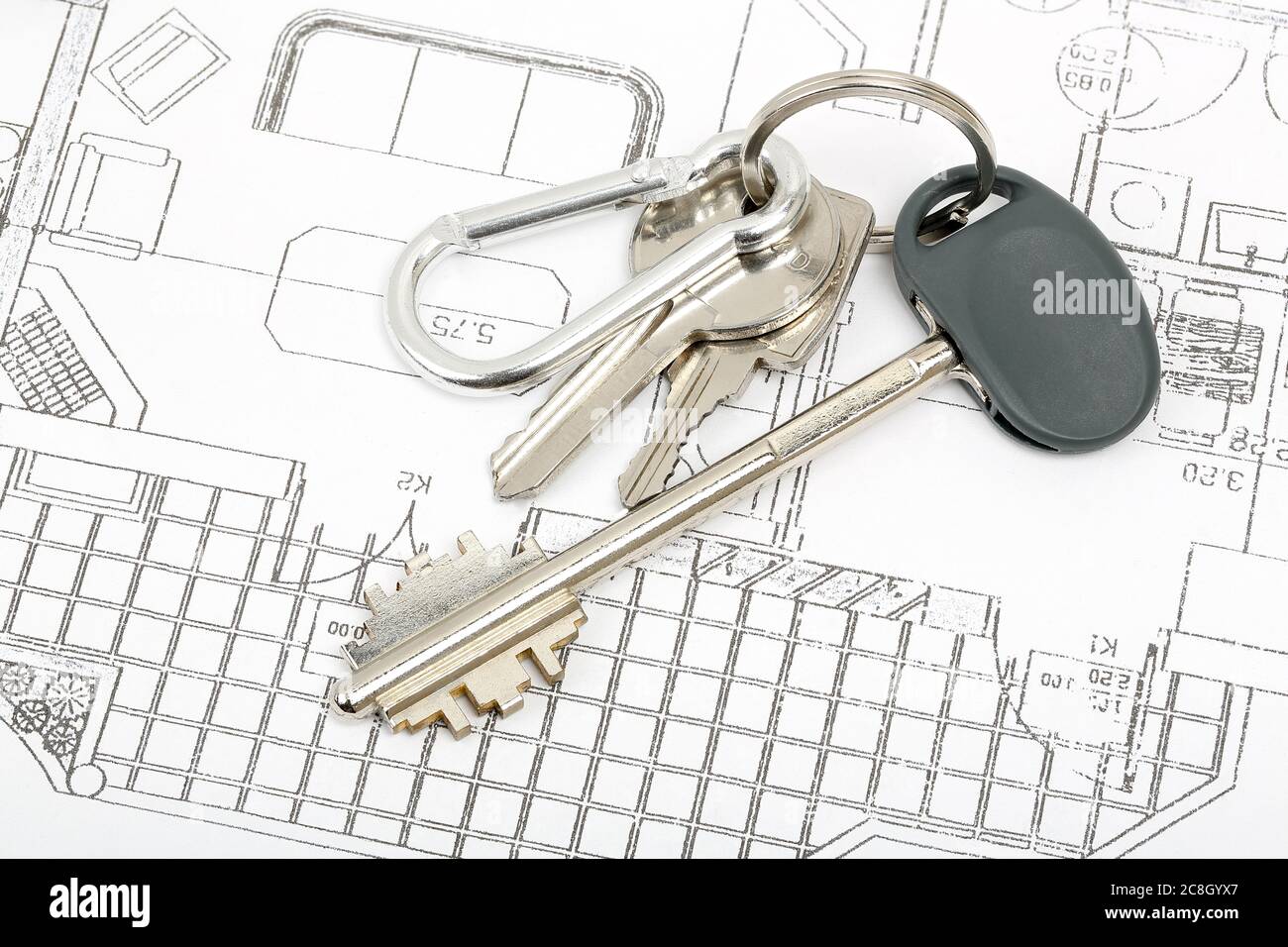 house concept with keys on blueprint Stock Photo - Alamy