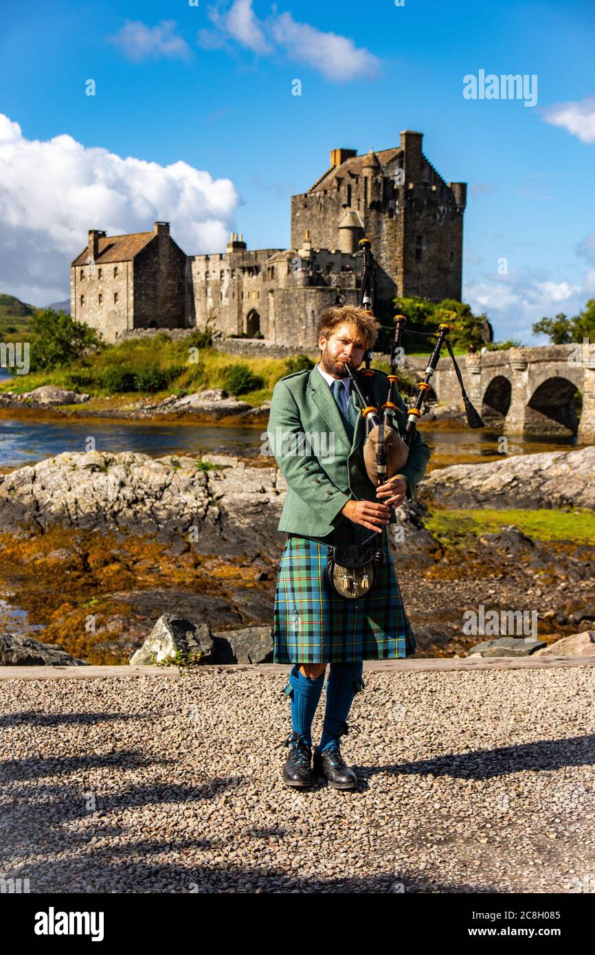 Dornie, SCOTLAND: Man dressed in typical clothes playing a "Great ...