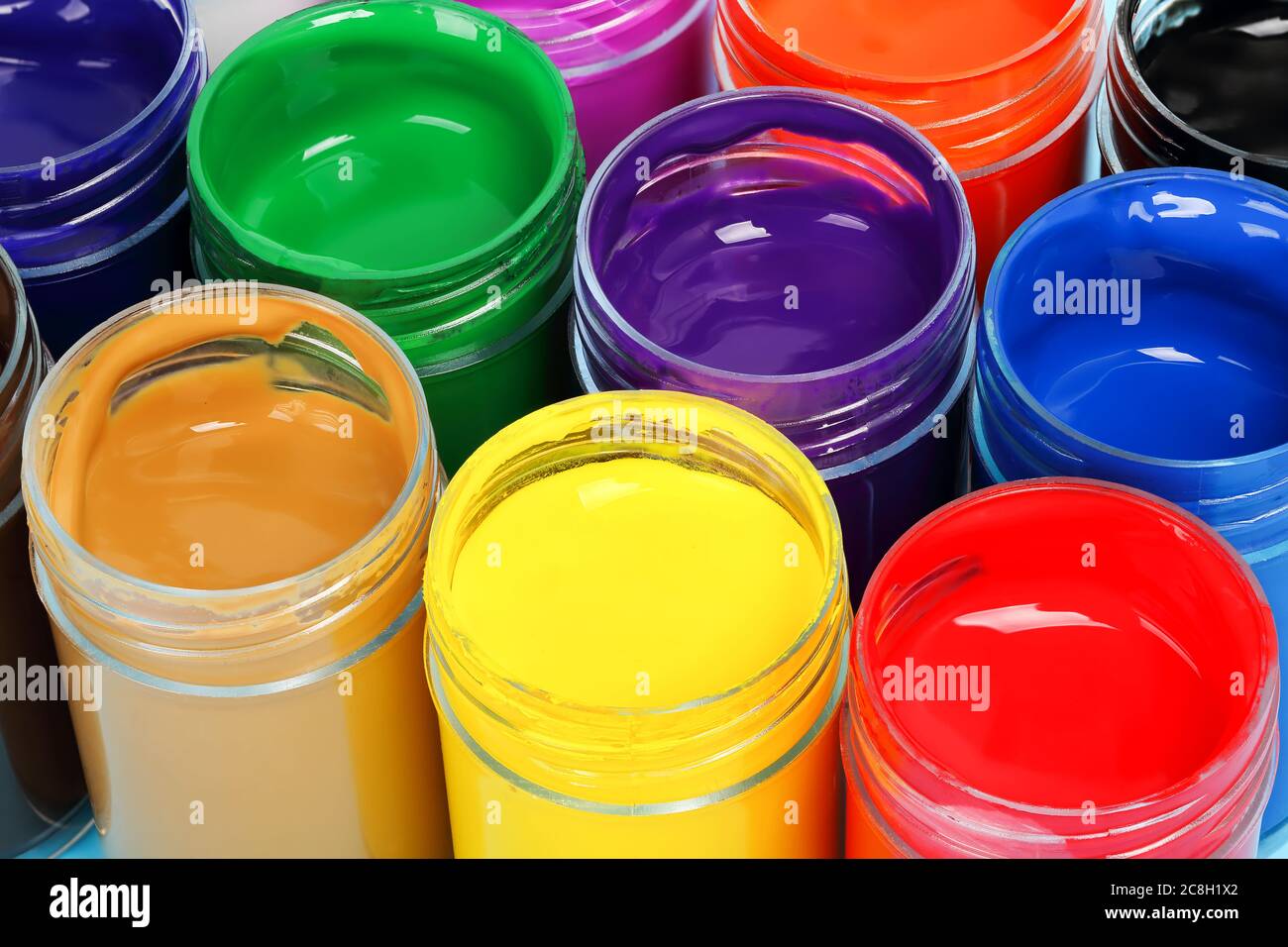 set of acrylic paints in containers closeup Stock Photo - Alamy