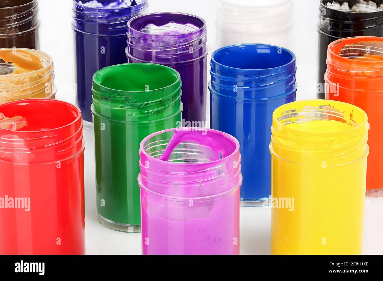 set of paints in containers closeup Stock Photo - Alamy
