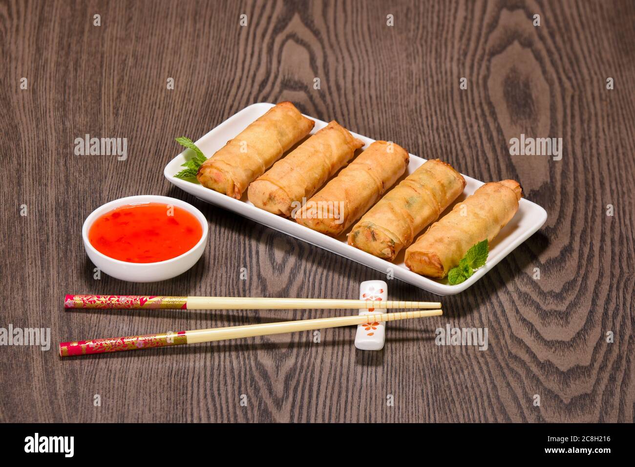 A delicious plate of spring rolls Stock Photo - Alamy