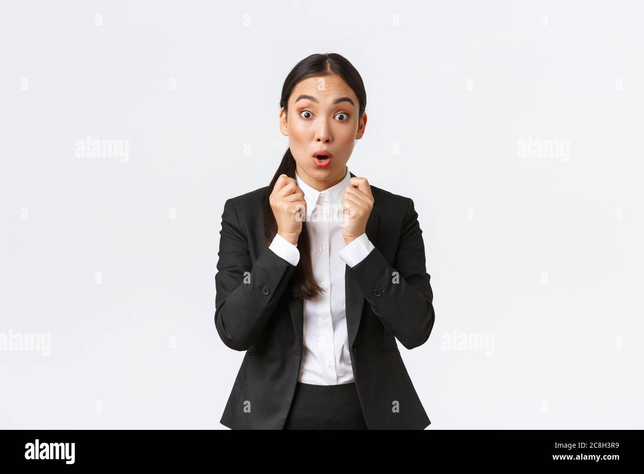 Impressed and excited businesswoman, real estate agent hear amazing ...