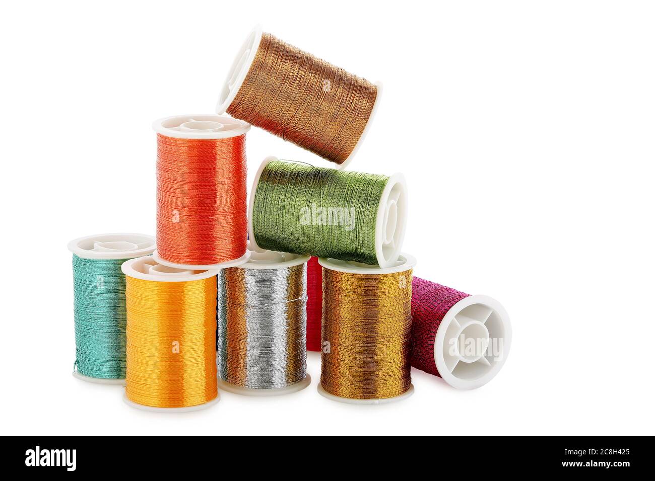 colorful spools of thread isolated on white Stock Photo - Alamy