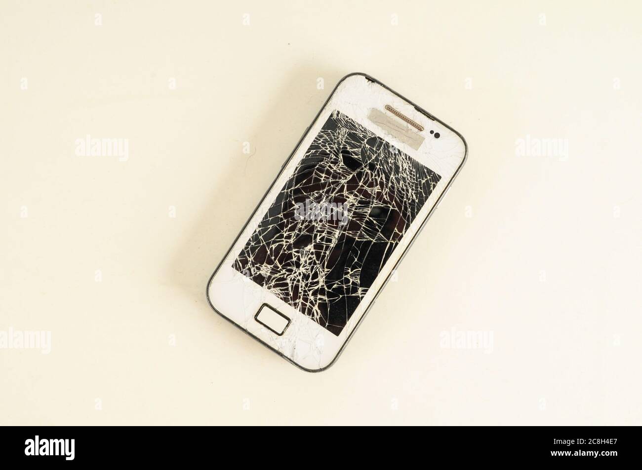 Mobile modern touchscreen smartphone with broken screen isolated on ...