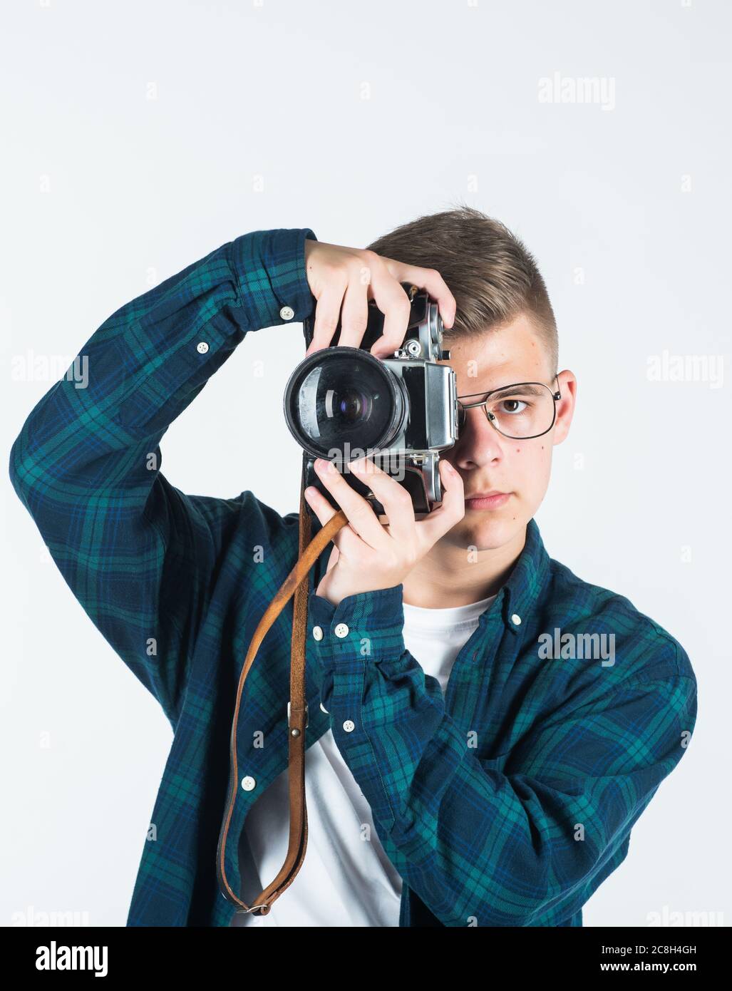 Busy at work. digital camera technology. young teen reporter. travel ...