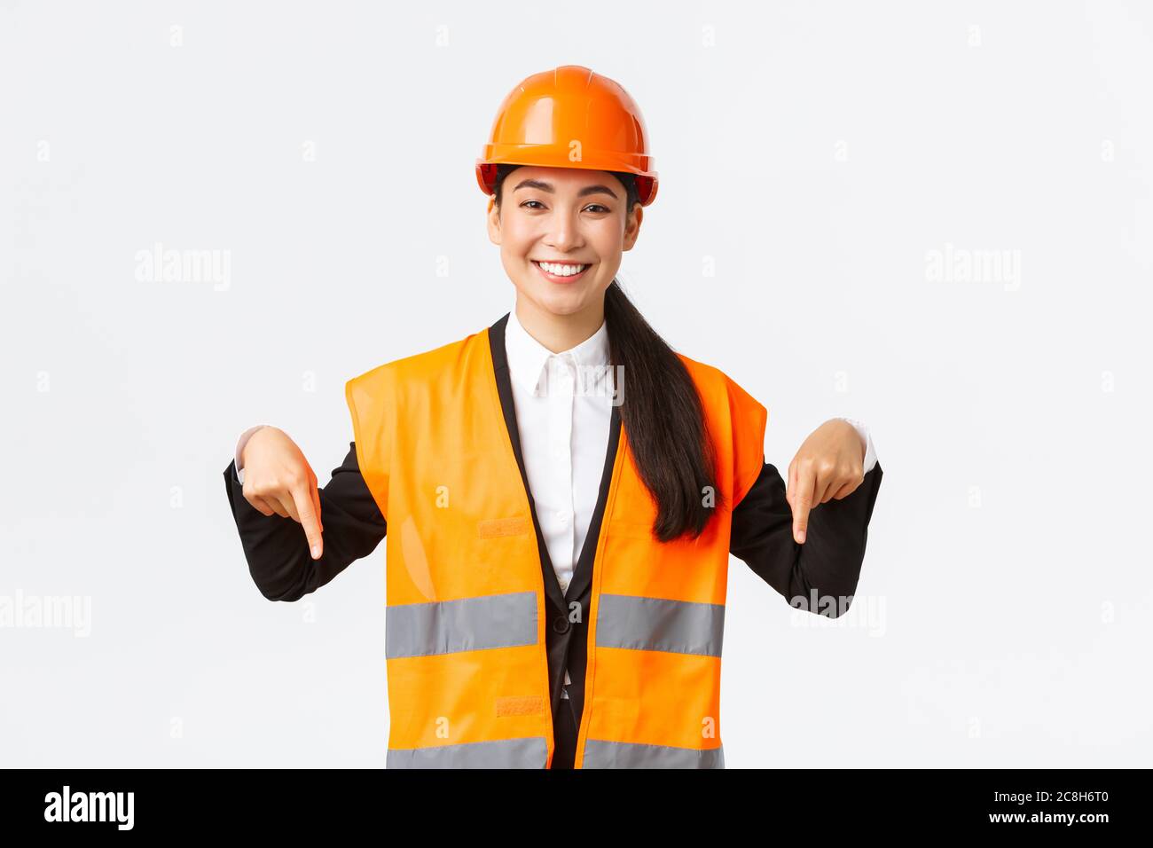 Smiling cheerful construction manager, asian female engineer in safety ...