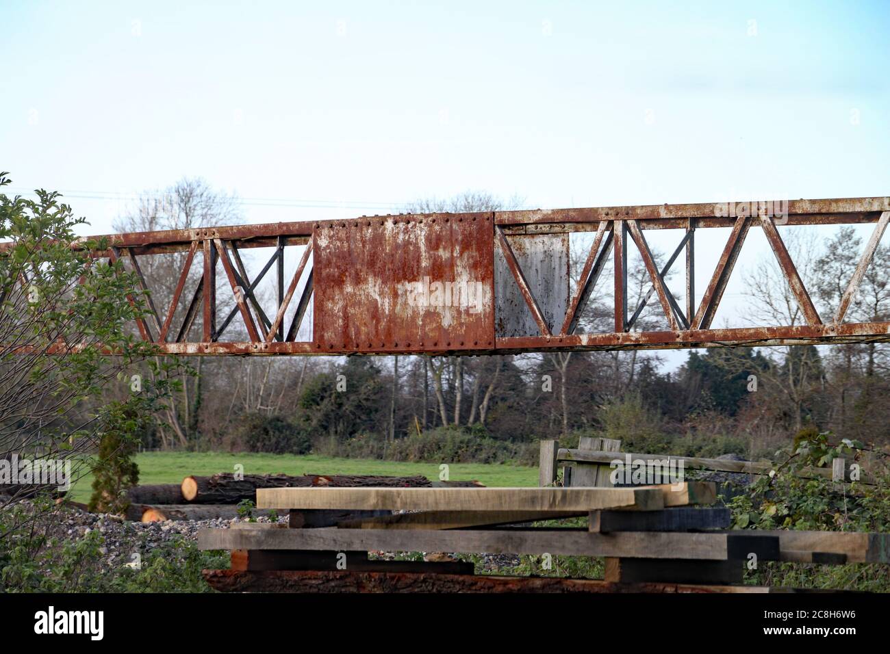 A horizontal girder of a rusty old crane in a wood yard in Somerset ...
