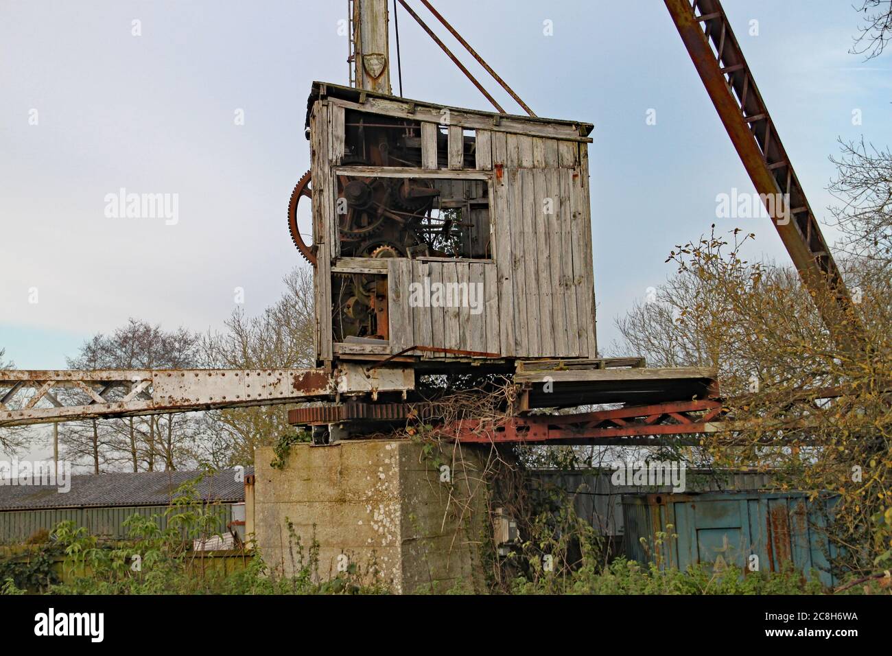 The wooden cabin of a rusty old crane in a wood yard in Somerset Stock ...