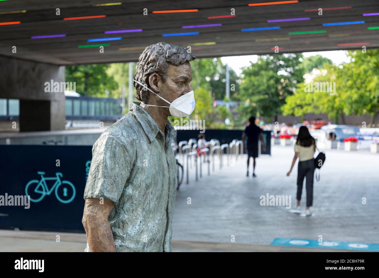 A face mask attached to a public sculpture during the COVID-19 pandemic ...