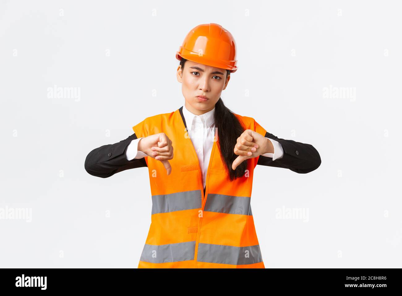 Disappointed and upset asian female chief engineer inspect bad work ...