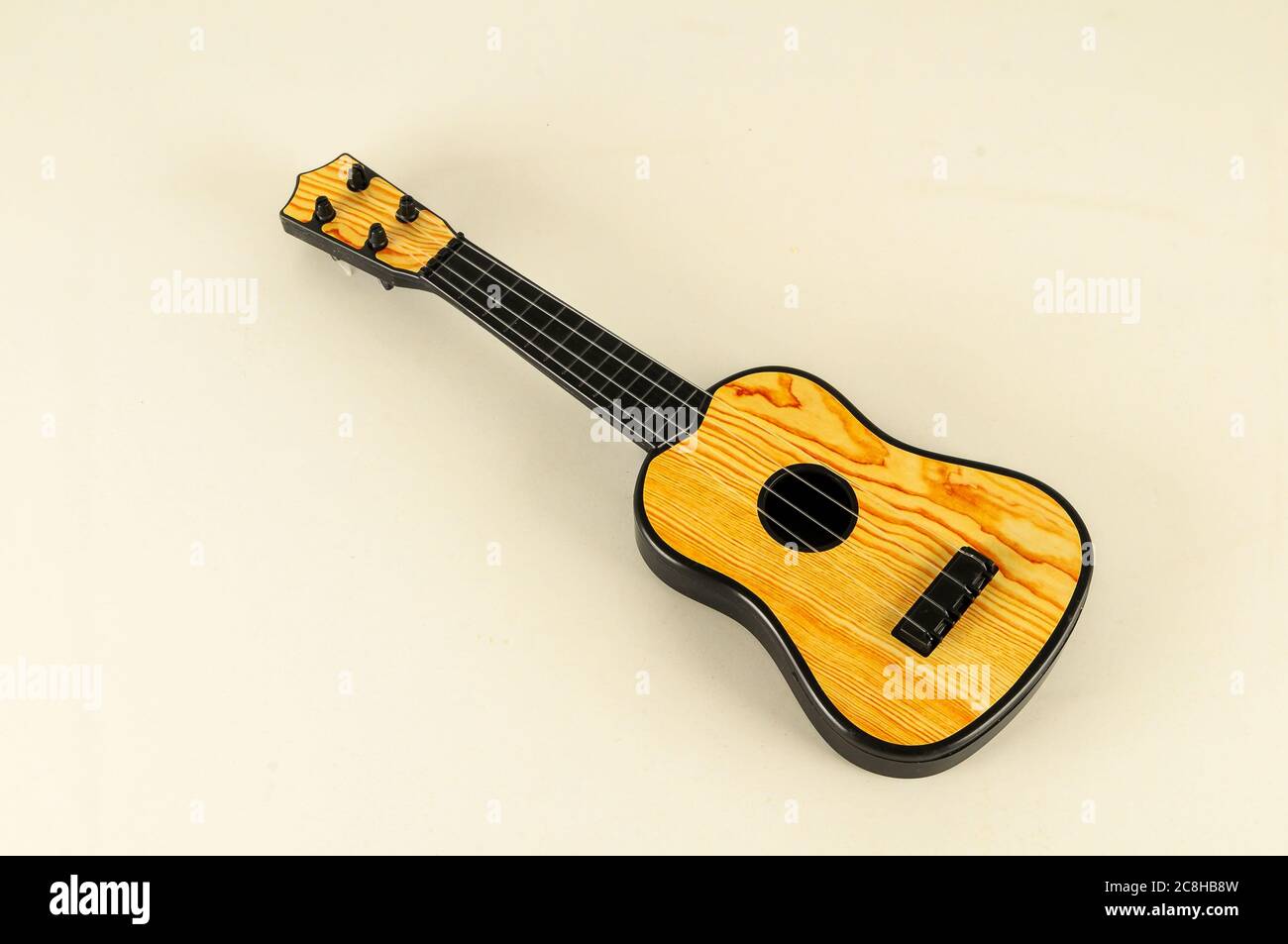 Toy bass guitar hi-res stock photography and images - Alamy
