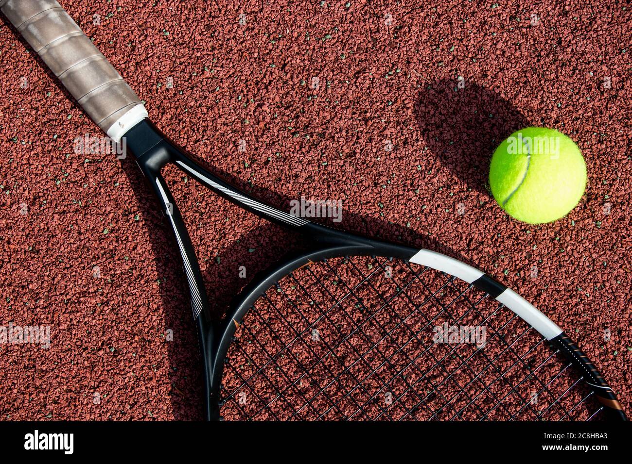 Tennis ball on racket strings hi-res stock photography and images - Alamy