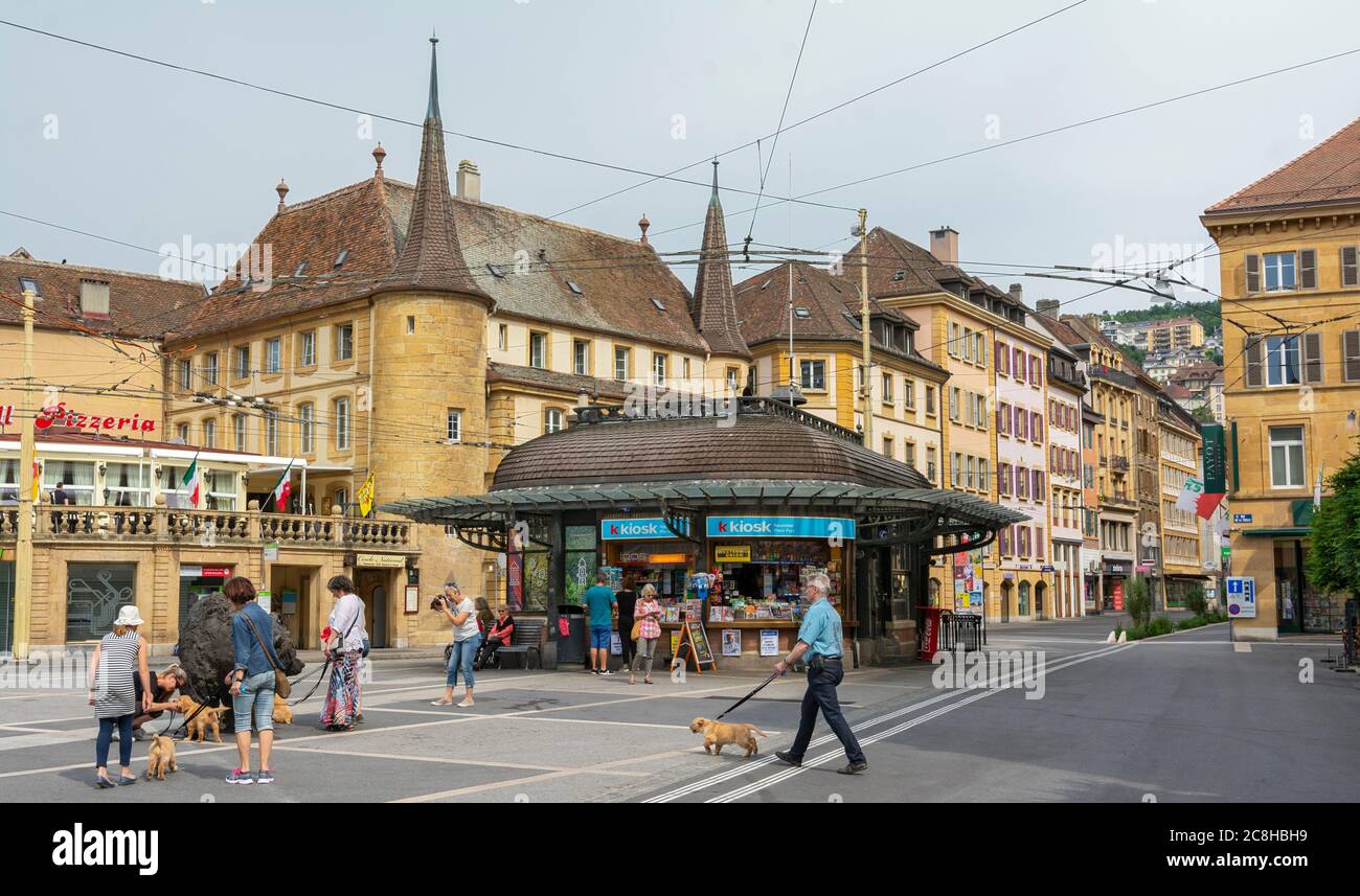 Switzerland, Neuchatel, Place Pury, kiosk, puppies gather at bear ...