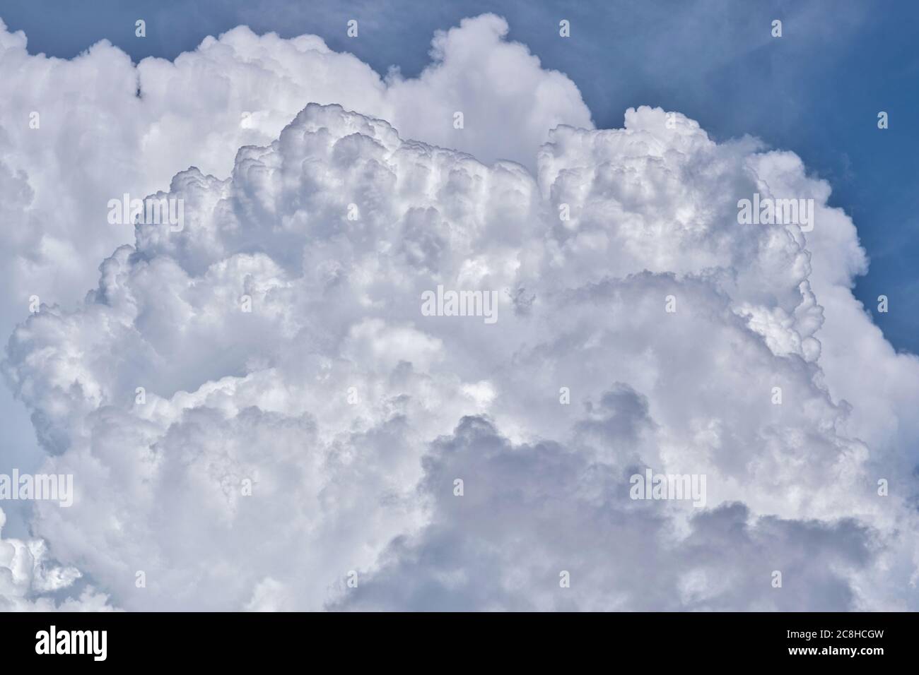 Towering Cumulus clouds forming in the sky before the onset of a ...