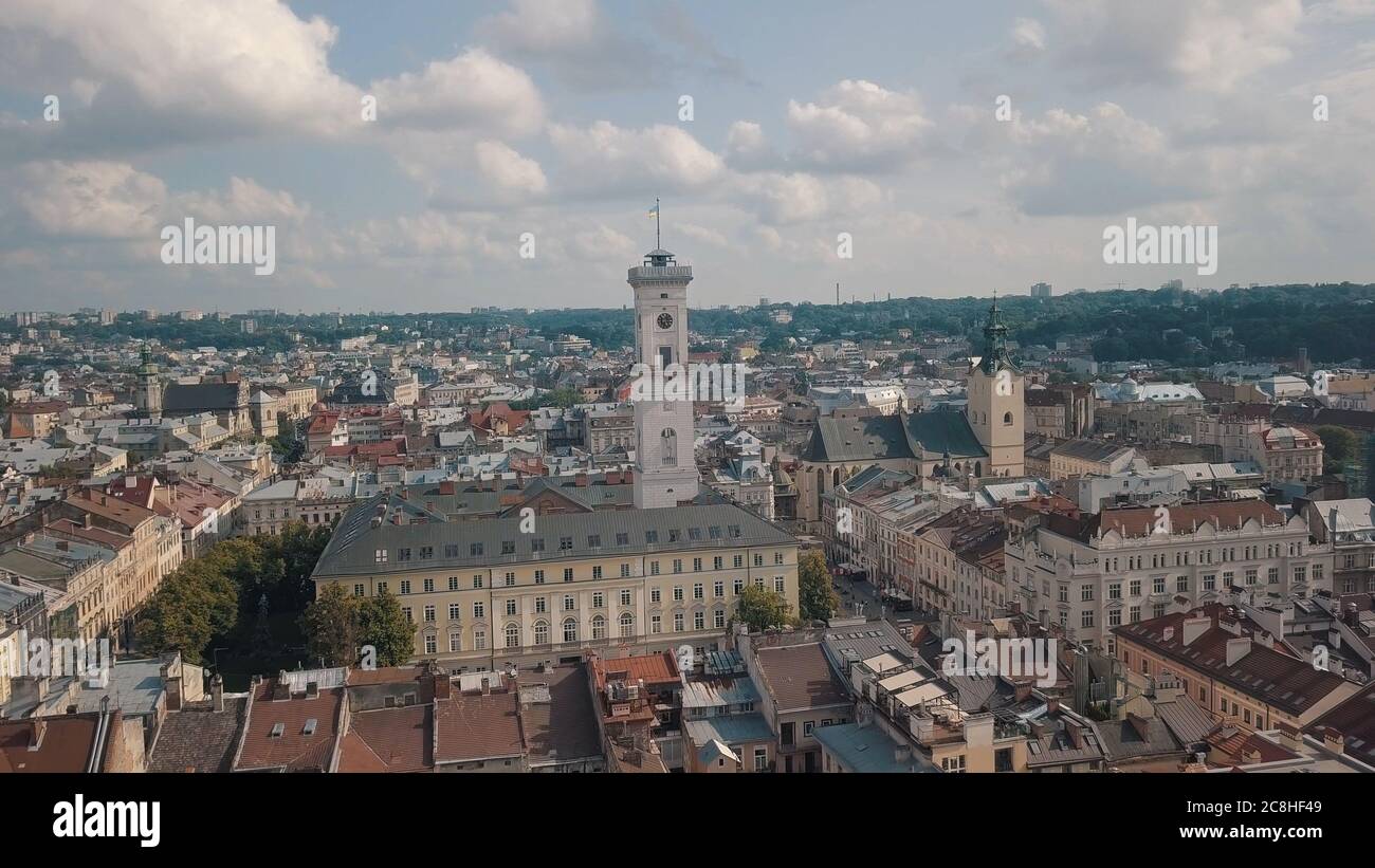 Aerial drone shot of city Lviv, Ukraine. Flight above roofs and streets ...