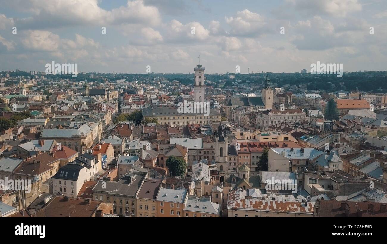 Aerial drone shot of city Lviv, Ukraine. Flight above roofs and streets ...