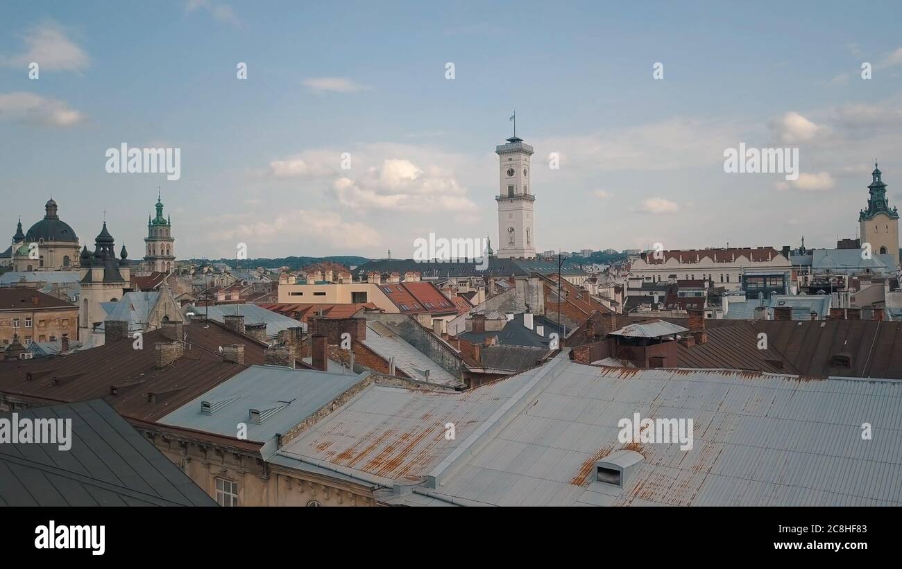 Aerial drone shot of city Lviv, Ukraine. Flight above roofs and streets ...