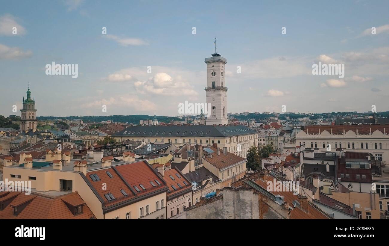 Aerial drone shot of city Lviv, Ukraine. Flight above roofs and streets ...