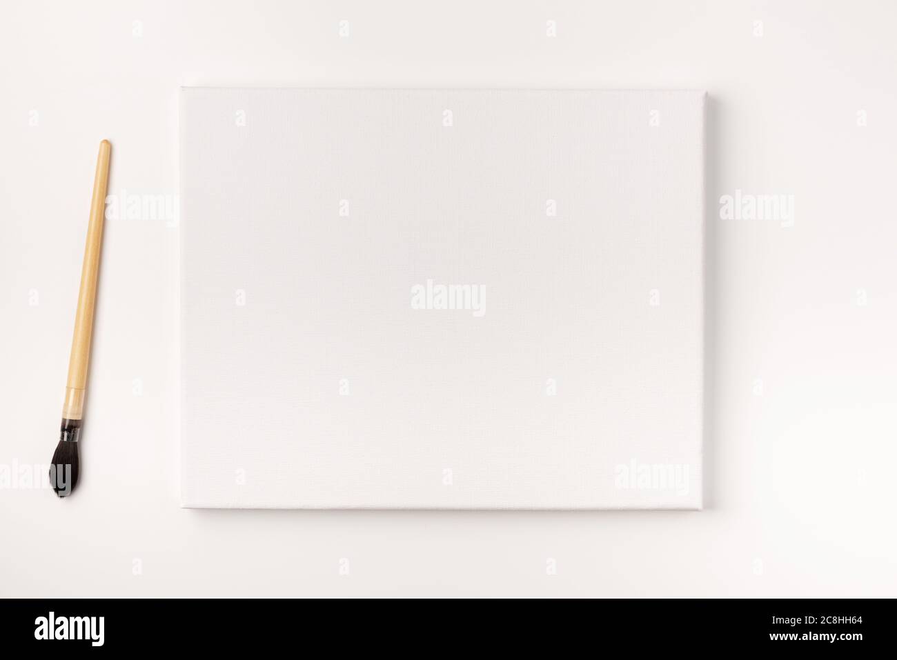 Blank painting canvas and brush isolated on white background. Painting ...
