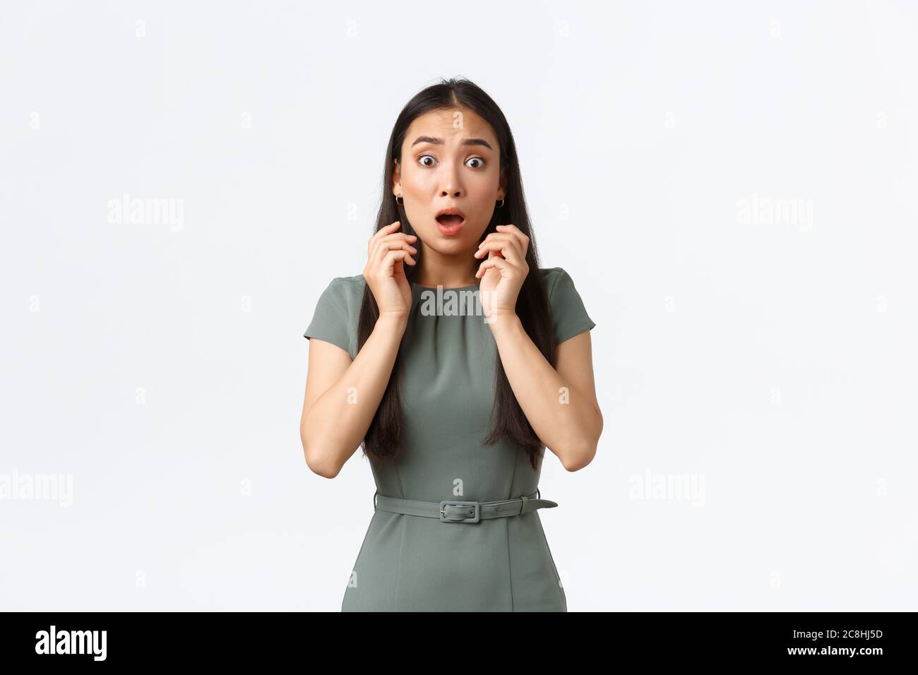 Small business owners, women entrepreneurs concept. Shocked and scared ...