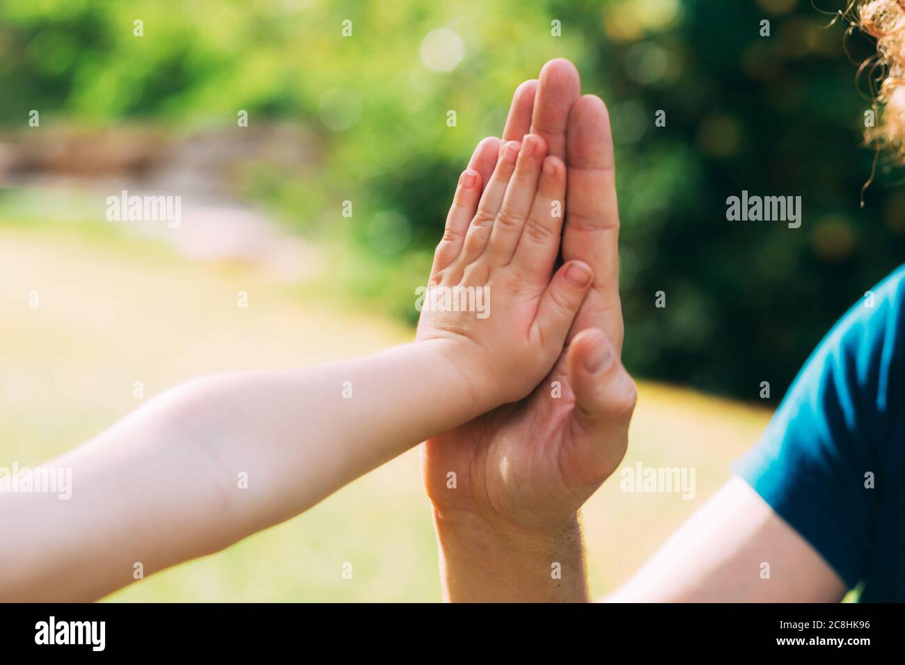Father's day. Dad and son. Children's hand and father's hand, give five ...