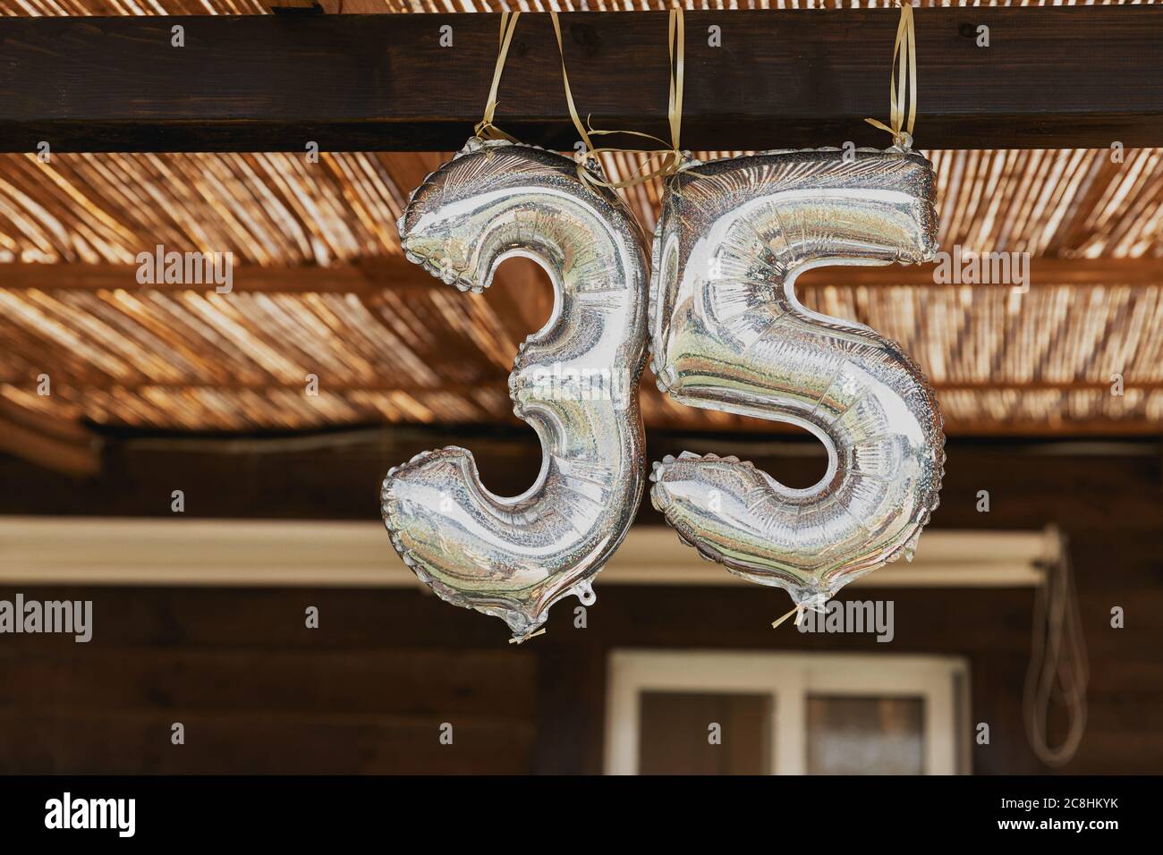 Happy 35th birthday party celebration balloon. Silver number thirty ...