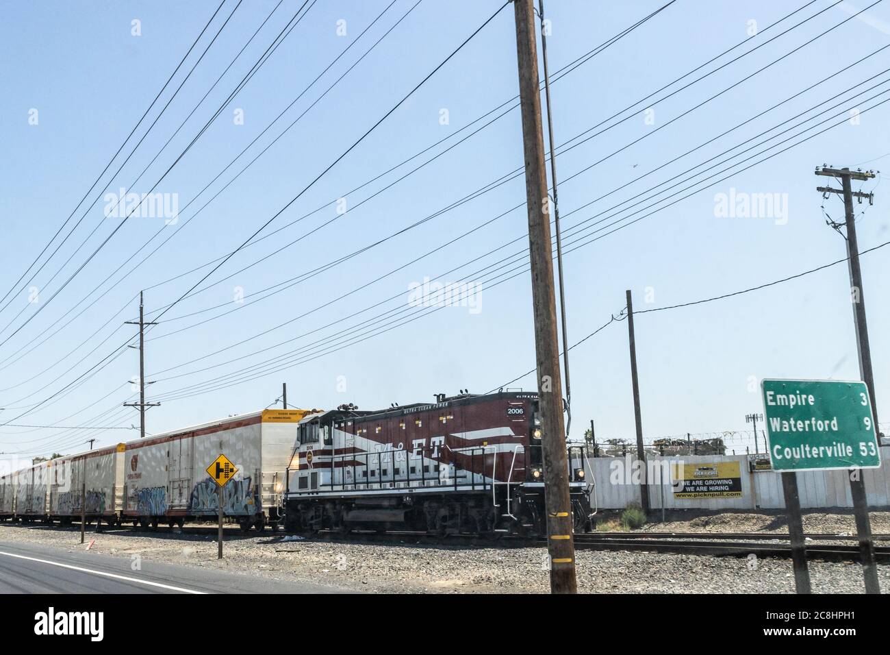 The Modesto and Empire Traction company engine shuttles rail cars ...