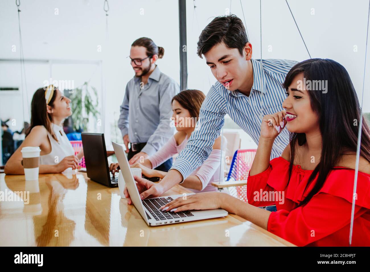 Latin students group or teamwork studying with computer in university ...