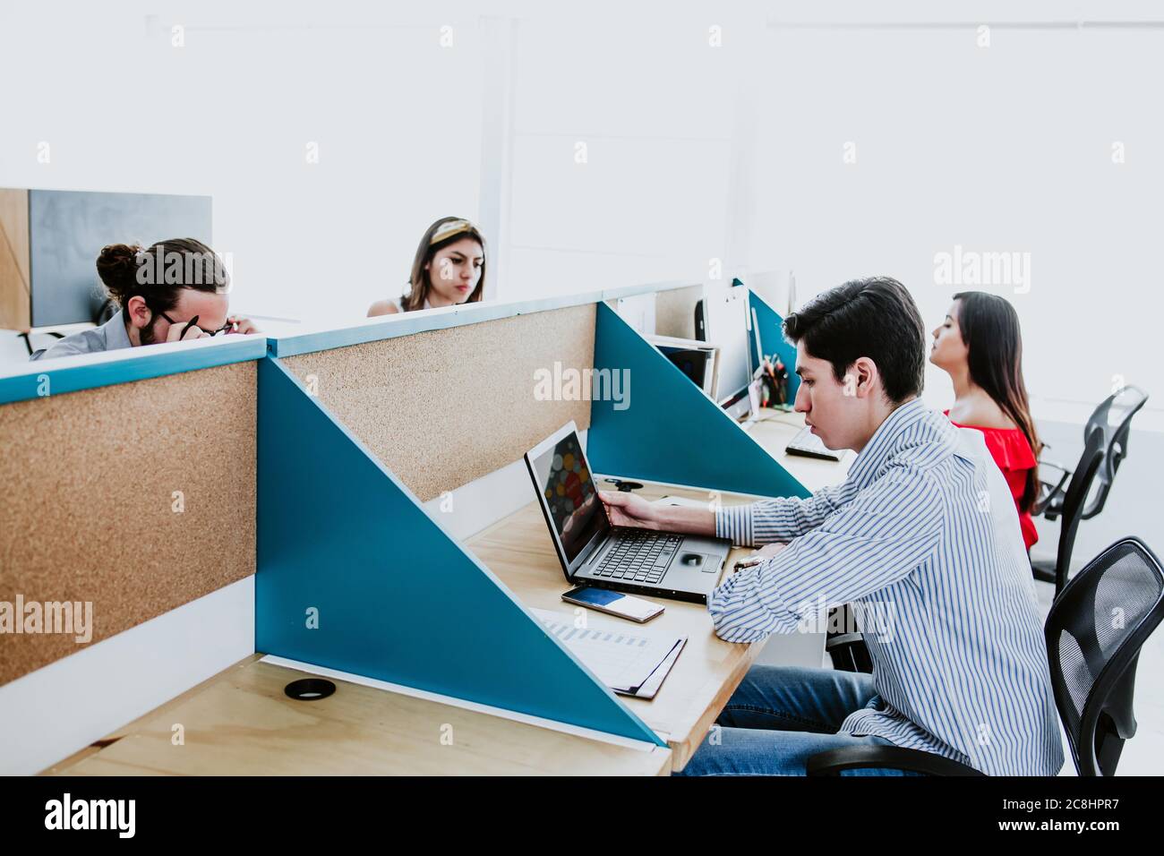 latin people at office working with computer, Group of young Mexican ...