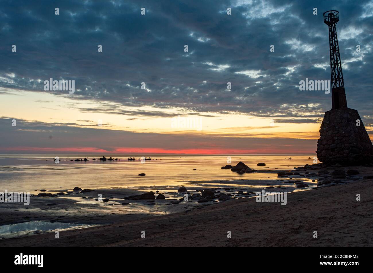 Crooked old beacon at the sea Stock Photo - Alamy
