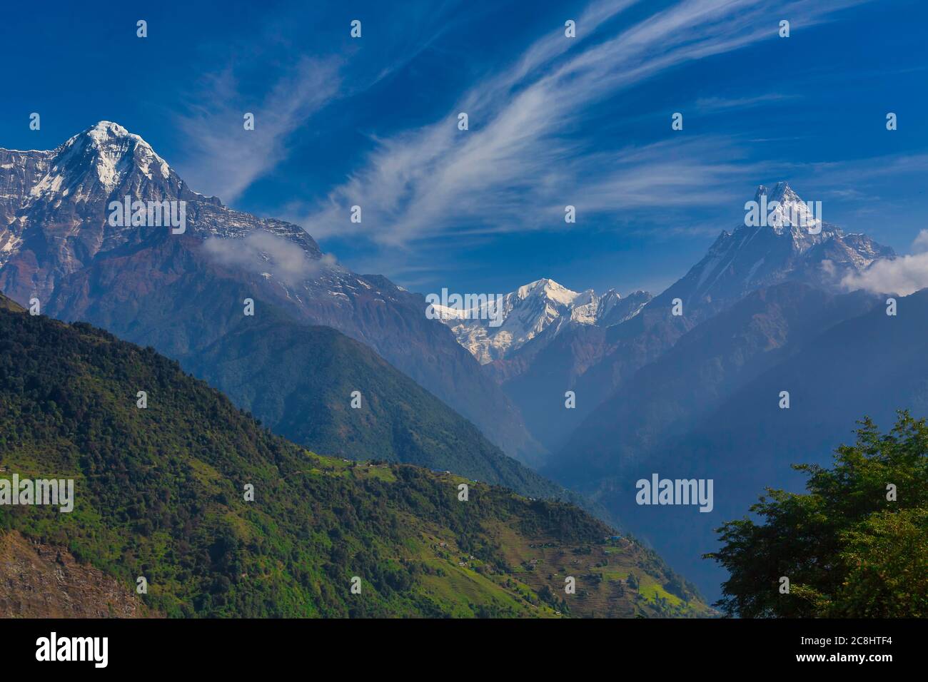 Mount Machhapuchhre or Fishtail in the Himalayas in Nepal. We can see ...