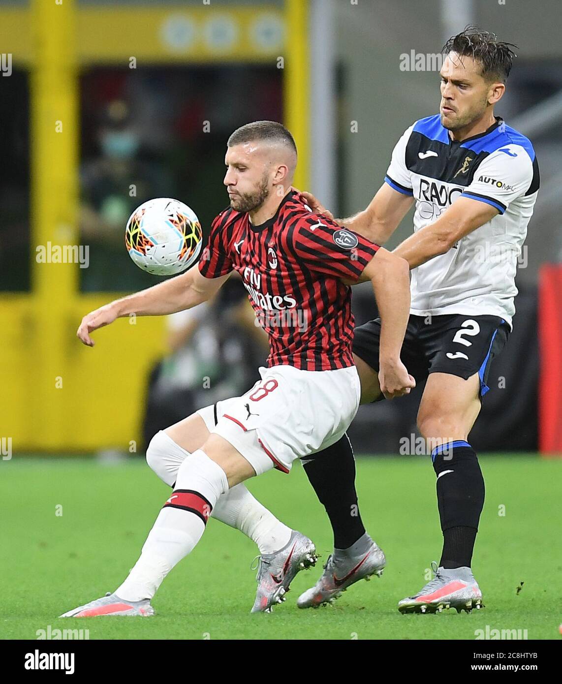 Milan, Italy. 24th July, 2020. AC Milan's Ante Rebic (L) vies with ...