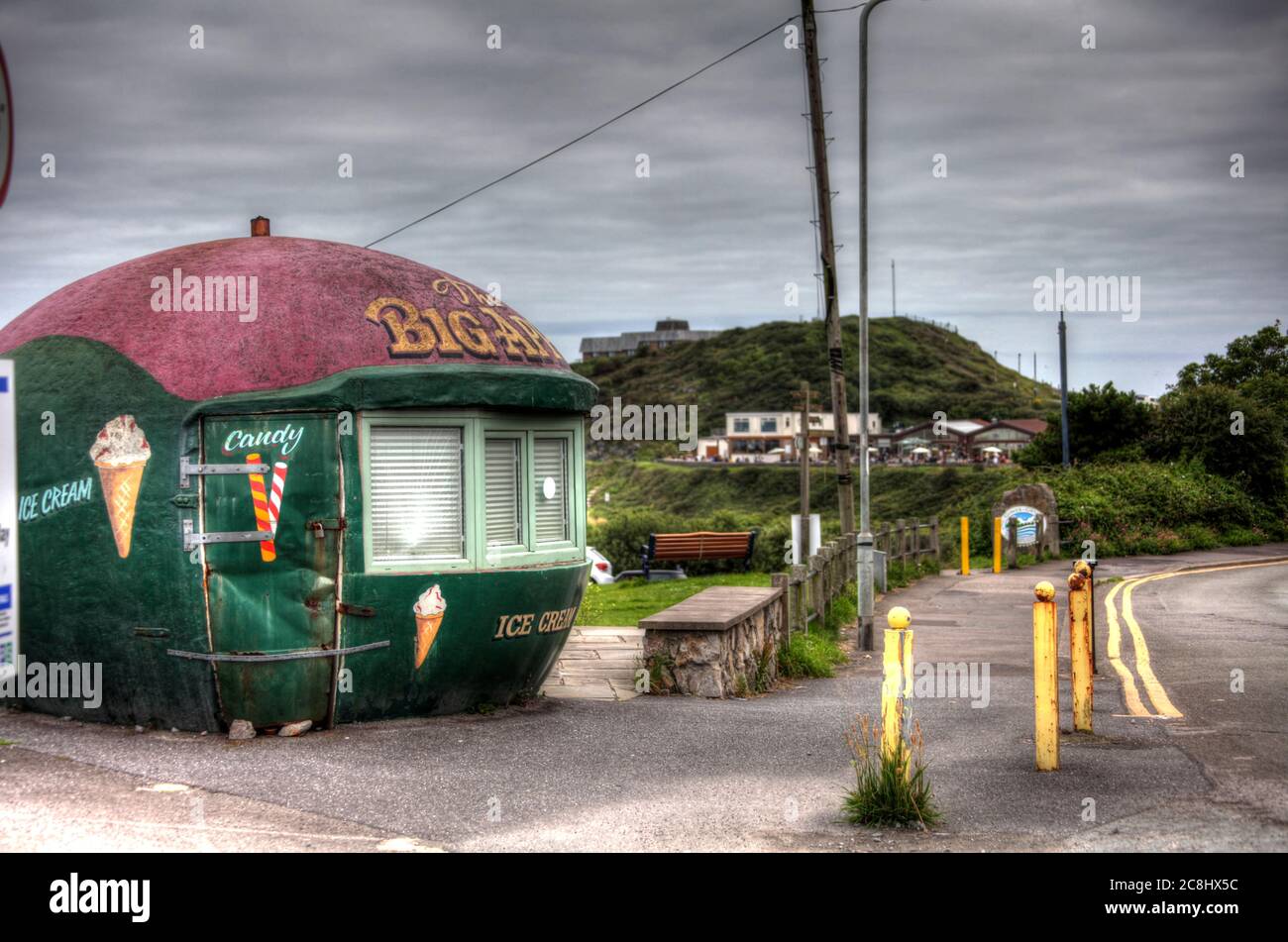 Apple shaped building set up as an ice cream stand at a beach. Big ...