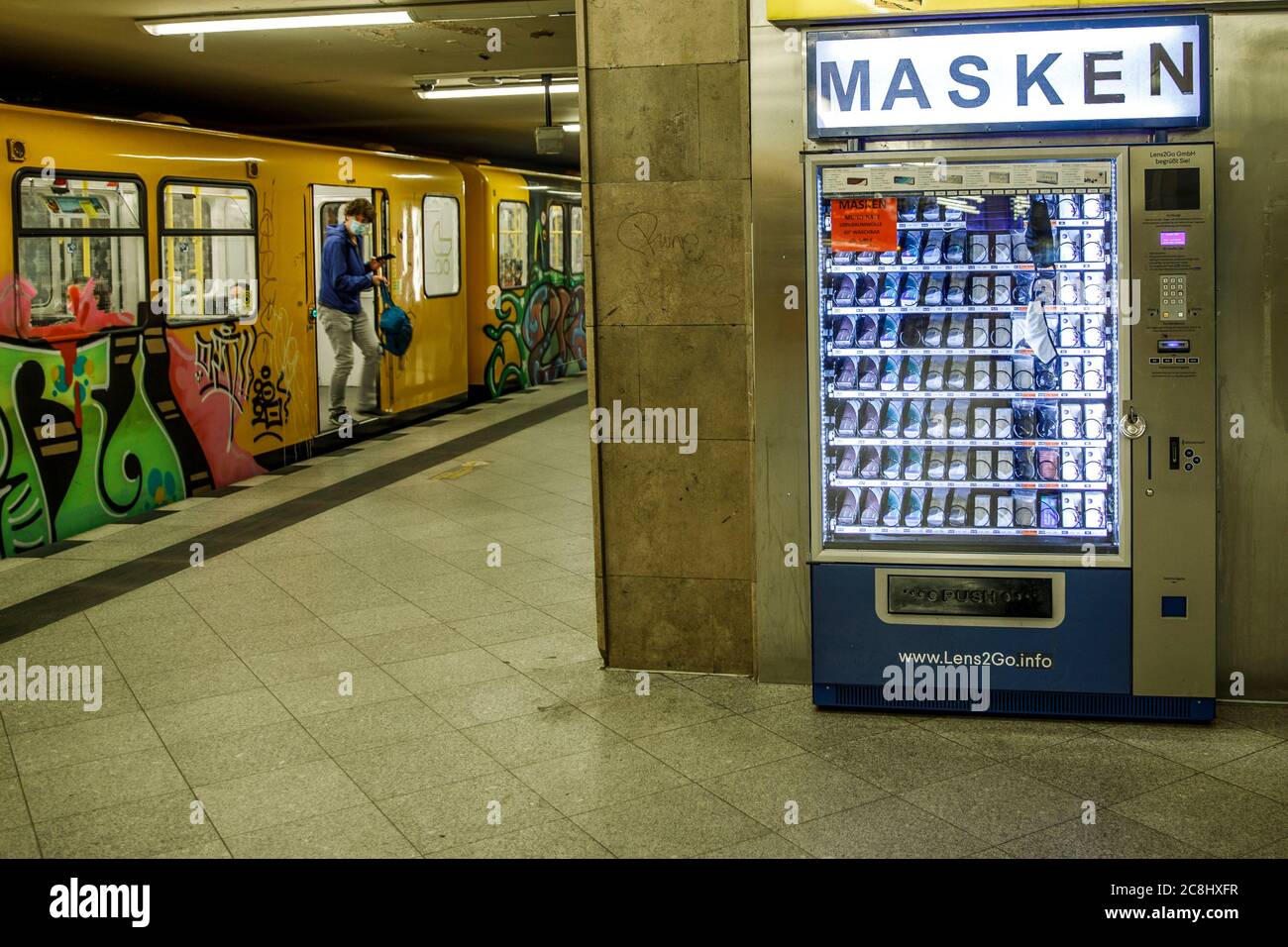 Masked people on trains hi-res stock photography and images - Alamy