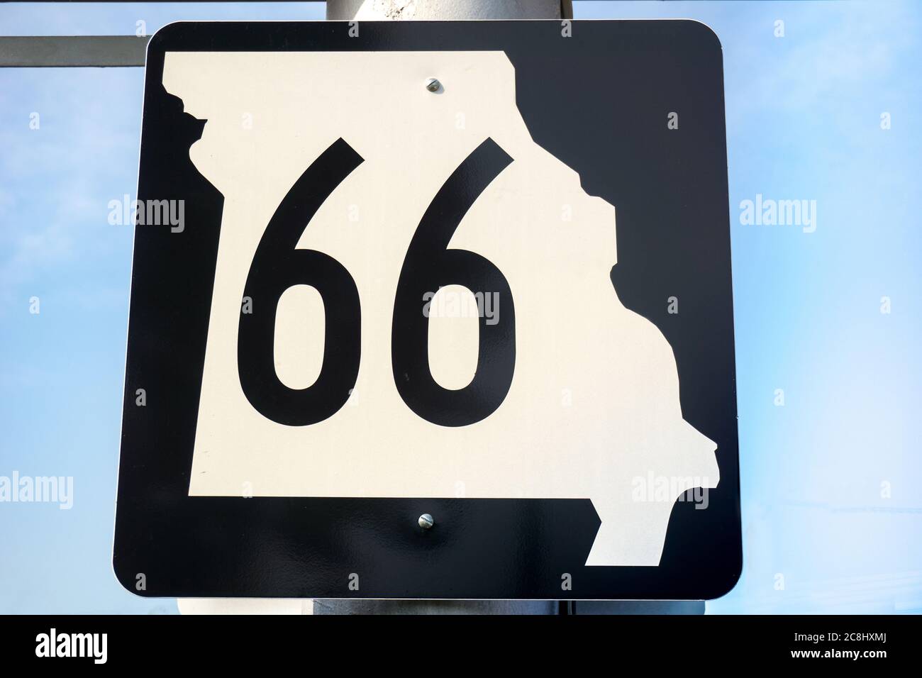 Missouri Route 66 roadsign with black route number on white cutout map ...